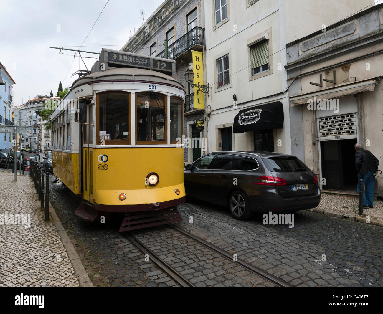 Tram 12, a historic yellow and white tram, Lisbon, Portugal Stock Photo ...