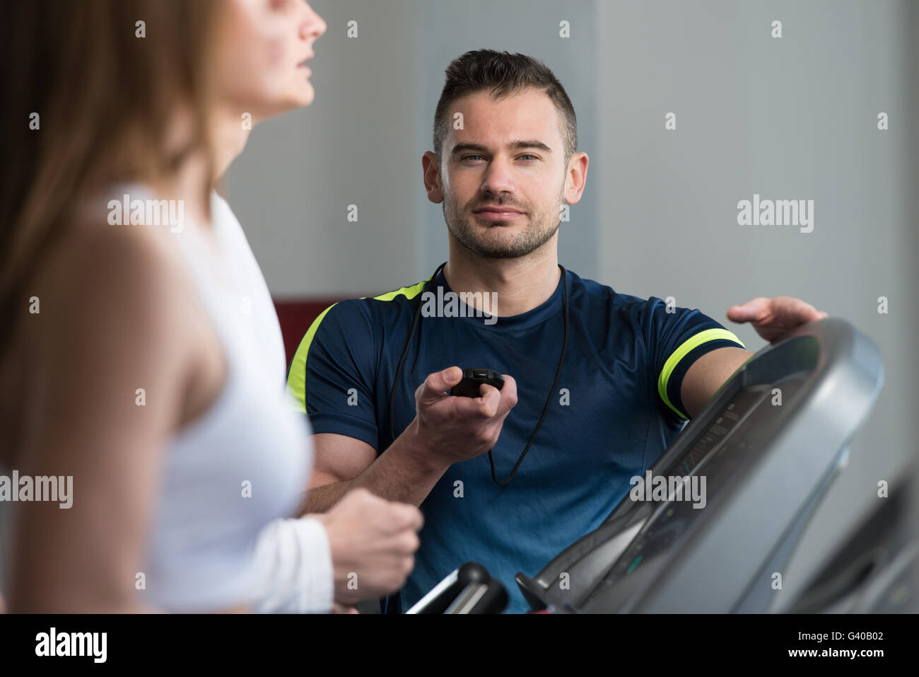 Group Of Young People Running On Treadmills In Gym Or Fitness Club ...