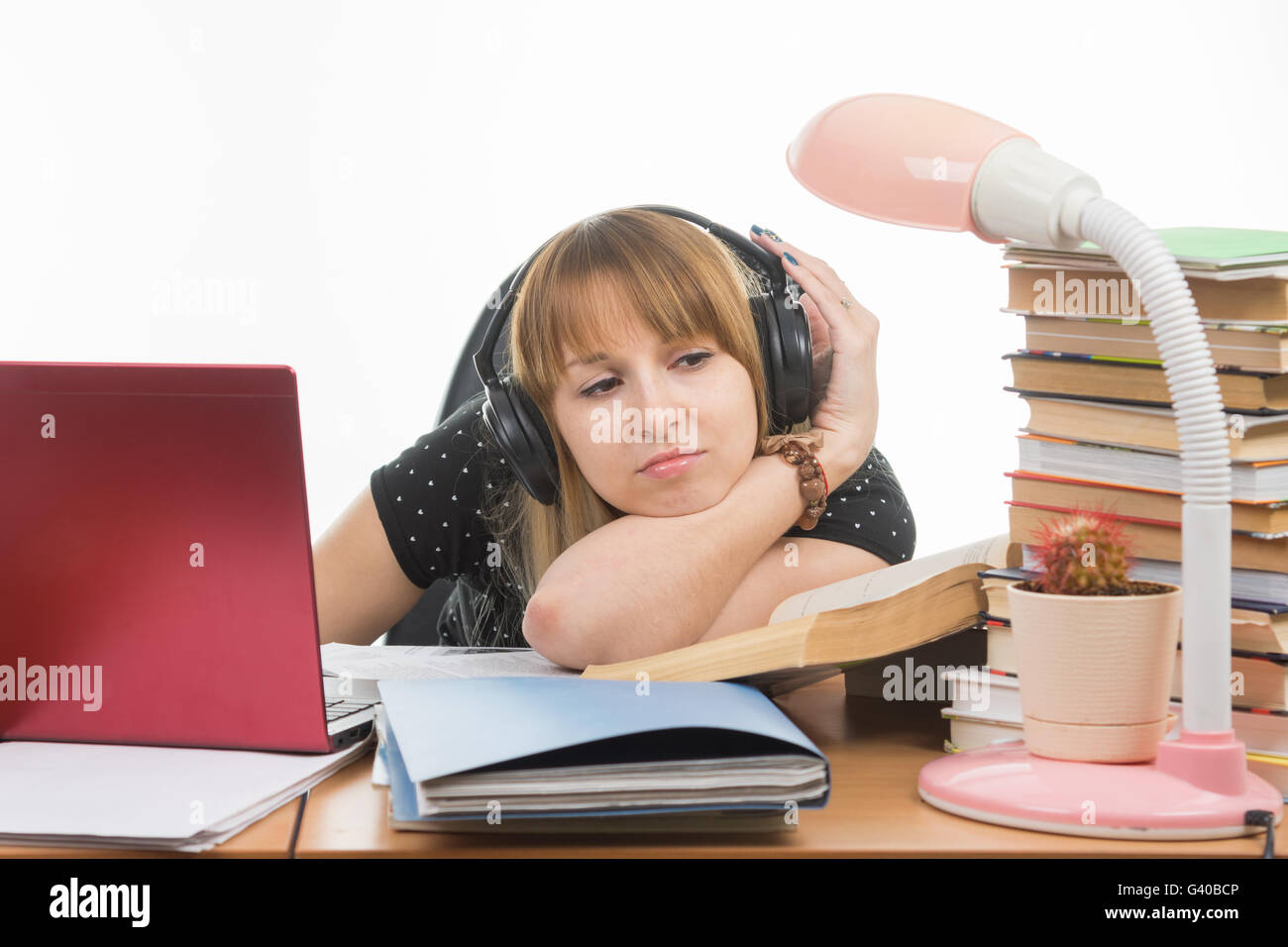 Student thinking sad looking at a cactus Stock Photo - Alamy
