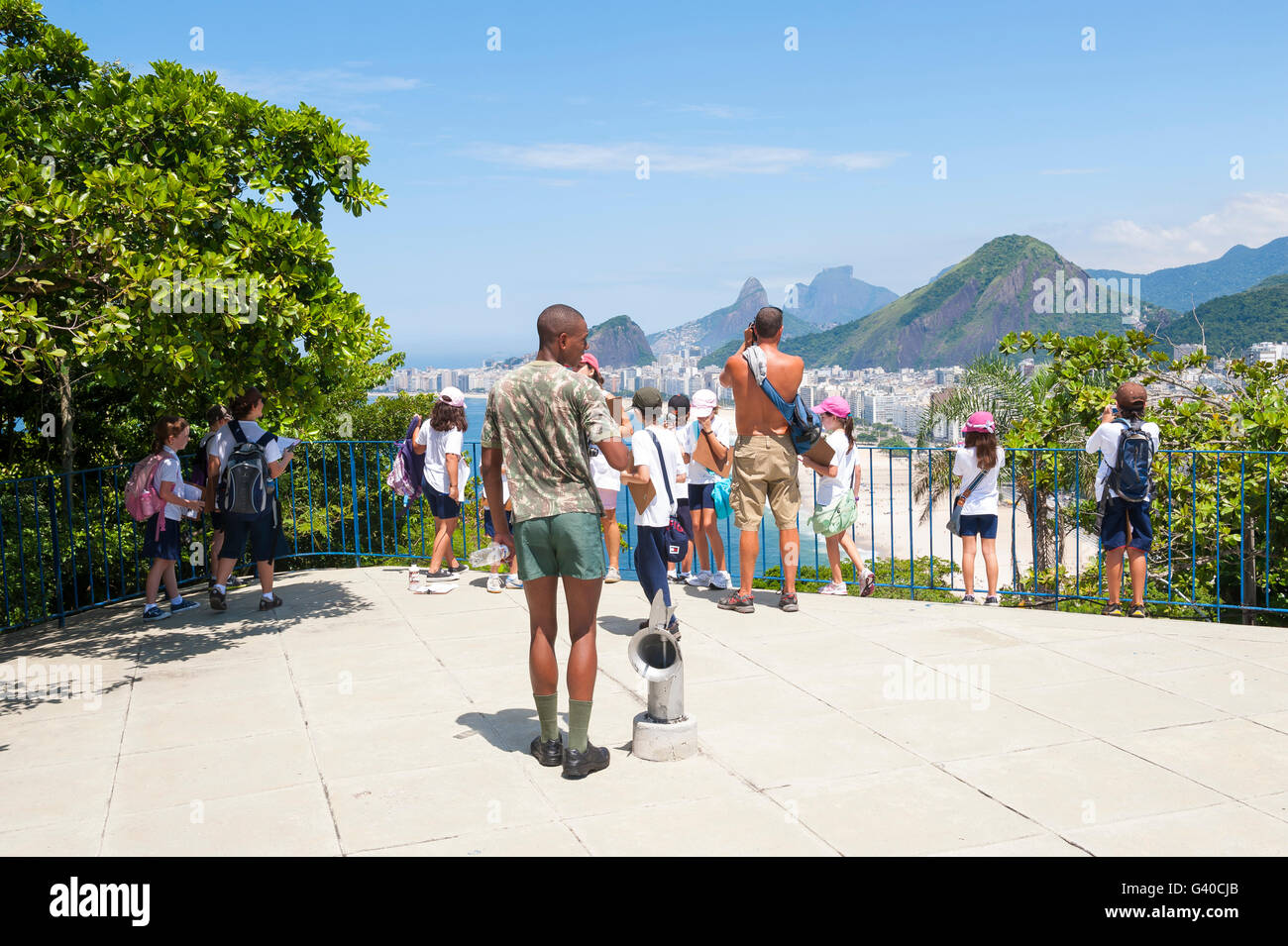 RIO DE JANEIRO - SEPTEMBER 15, 2015: A group of visitors gathers at an ...