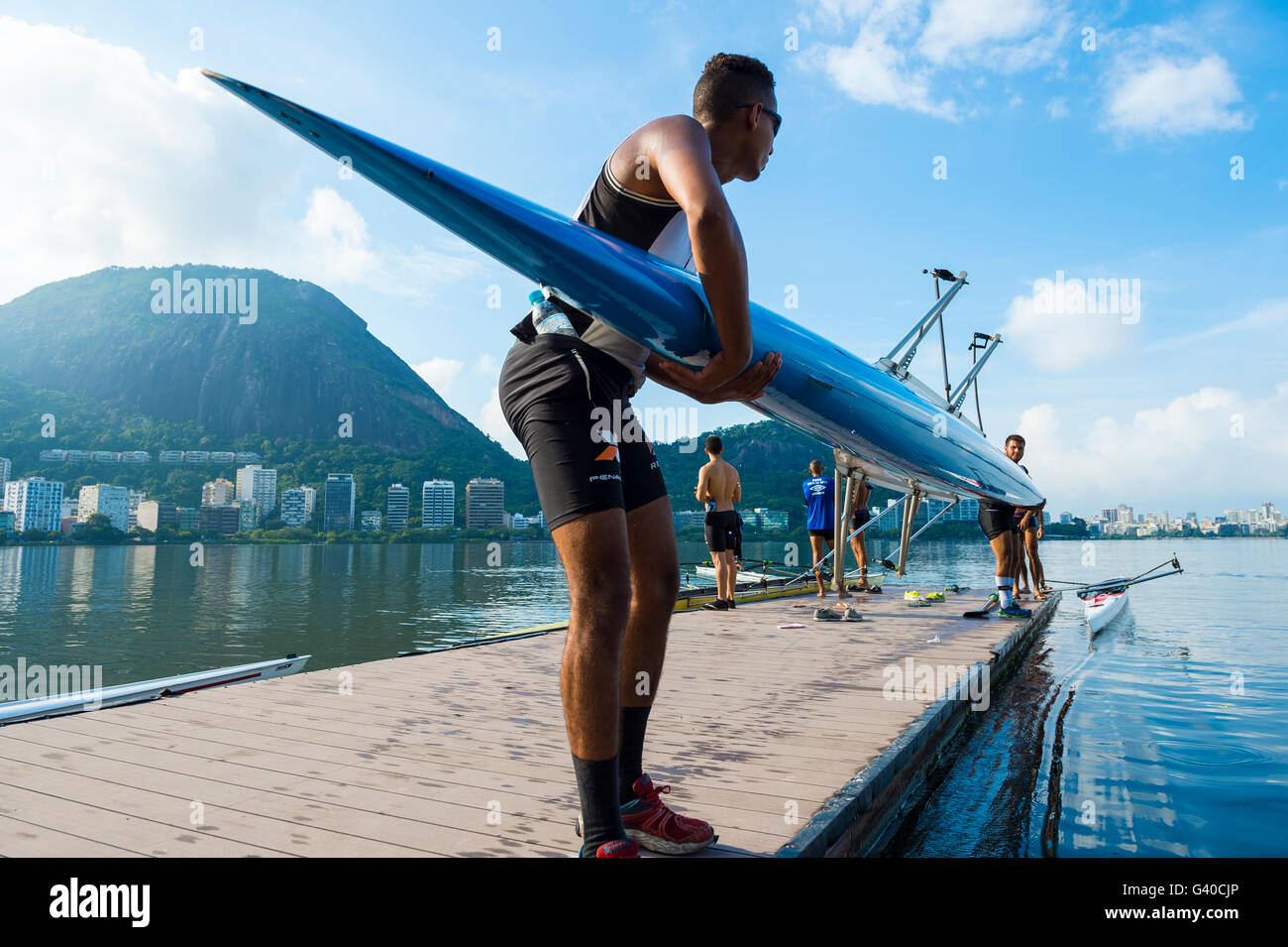 Man rowing a boat sunrise hi-res stock photography and images - Alamy