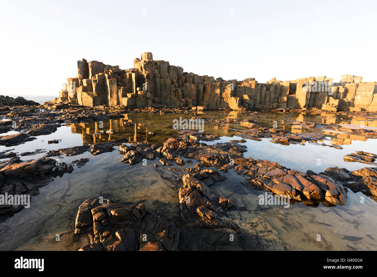 Early morning light over basalt columns of the disused Bombo Quarry ...