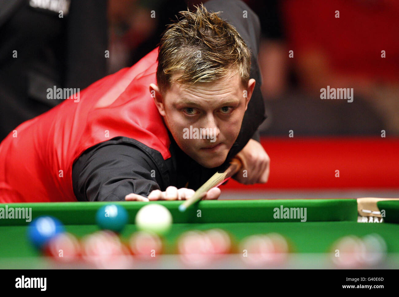 Mark Allen in action against Ronnie O'Sullivan during the Ladbrokes ...