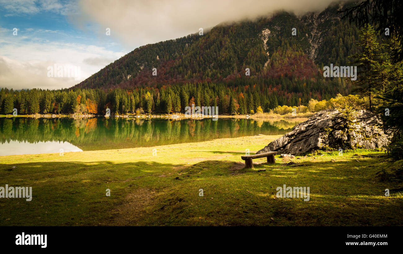 Fall in the italian alps in a misty day Stock Photo - Alamy