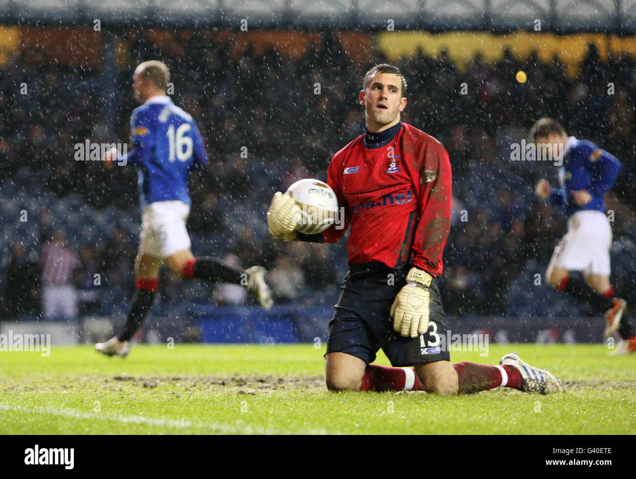 Rangers' Steven Whittaker(left) celebrates the third goal as Kilmarnock ...