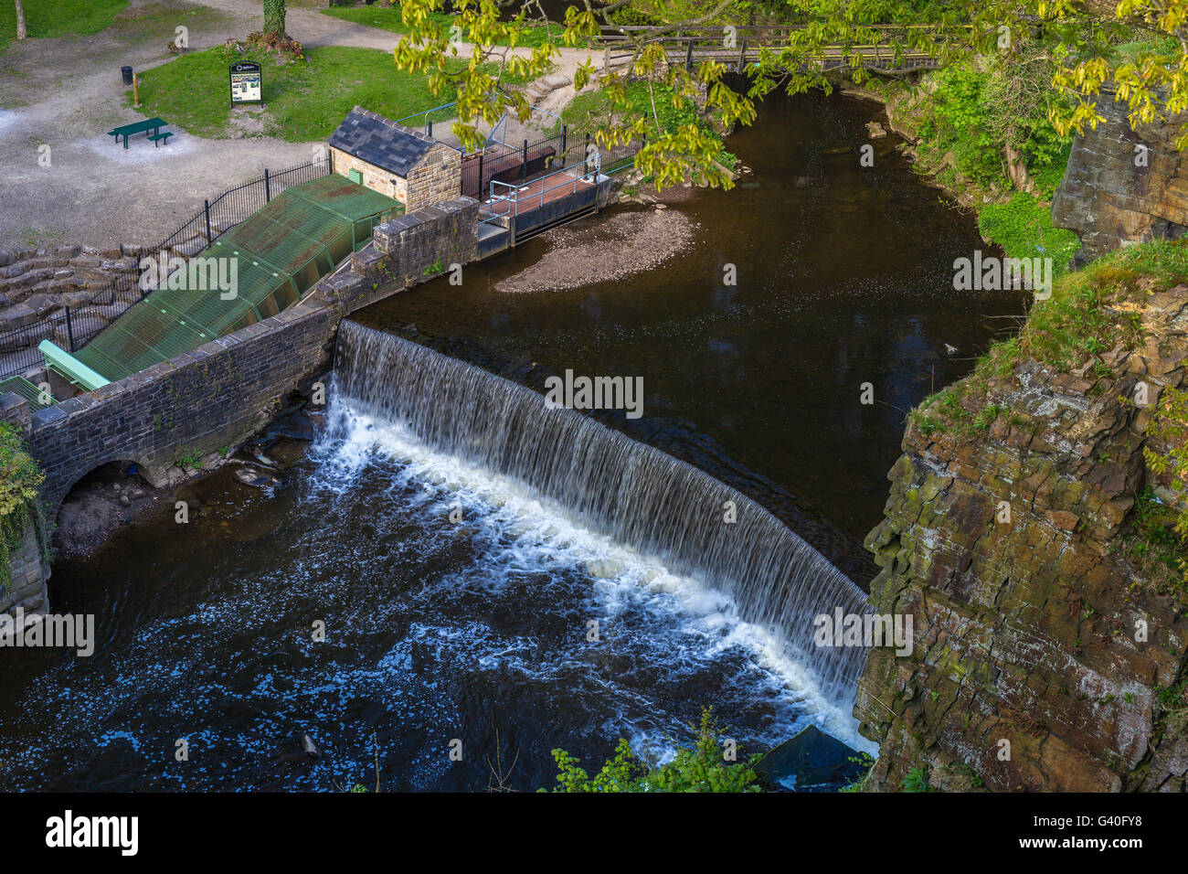 Looking down on the main weir on the River Goyt at New Mills Stock ...