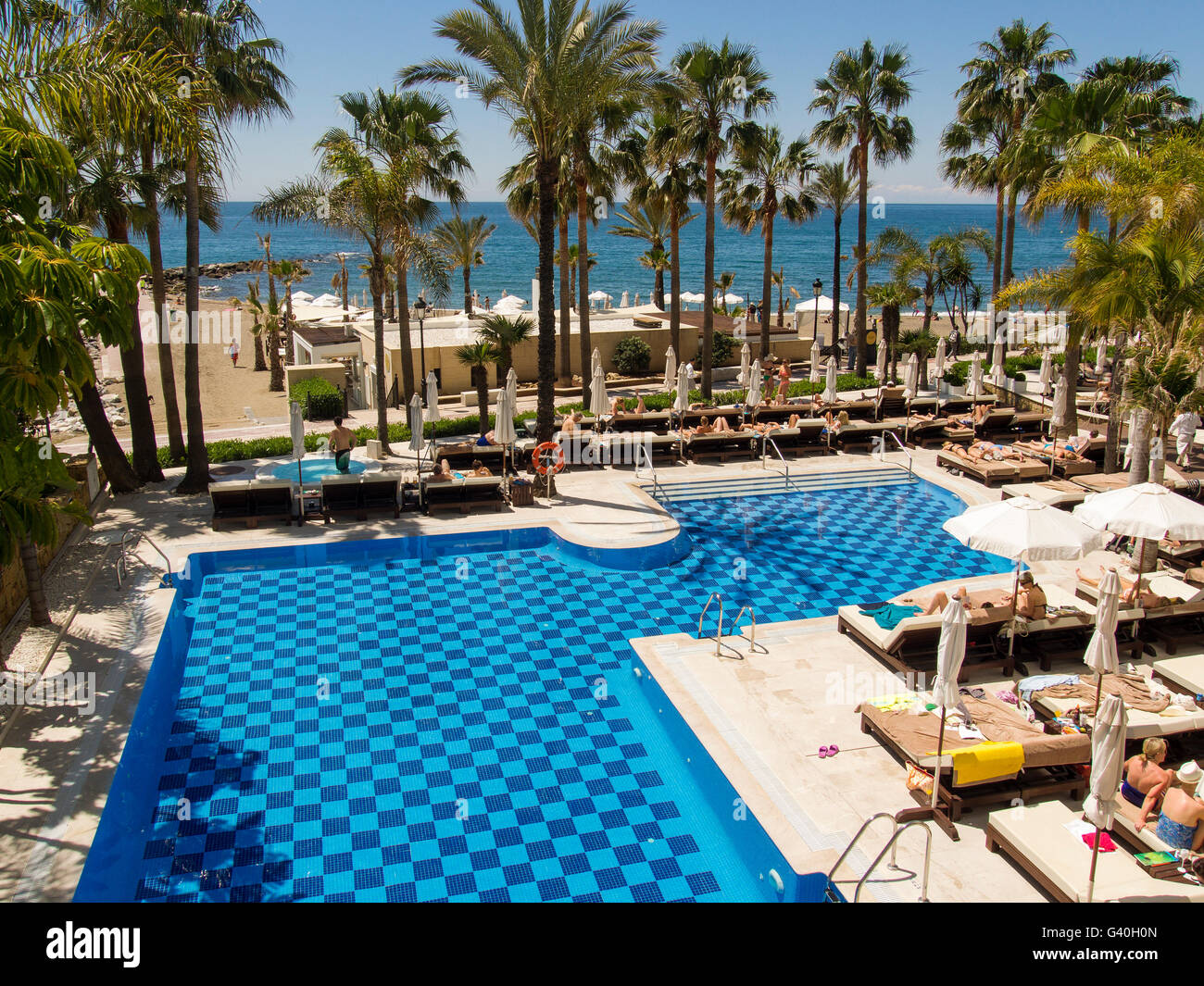 Swimming pool hotel tourists marbella hi-res stock photography and ...