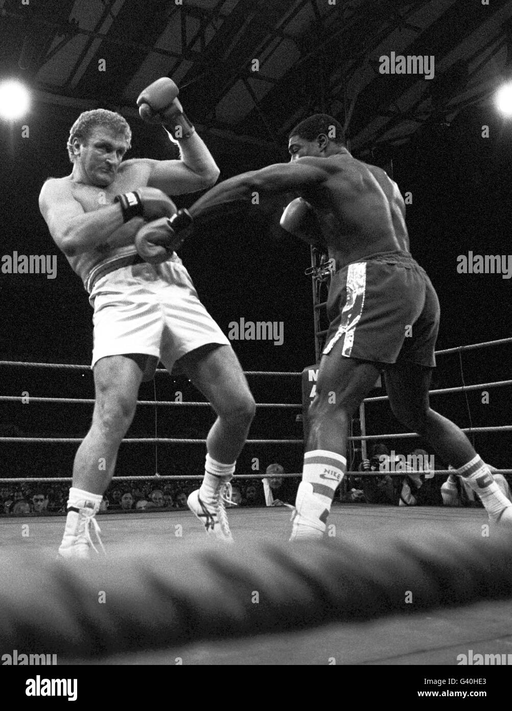 File picture of boxer Joe Bugner (l) in action against Frank Bruno in ...