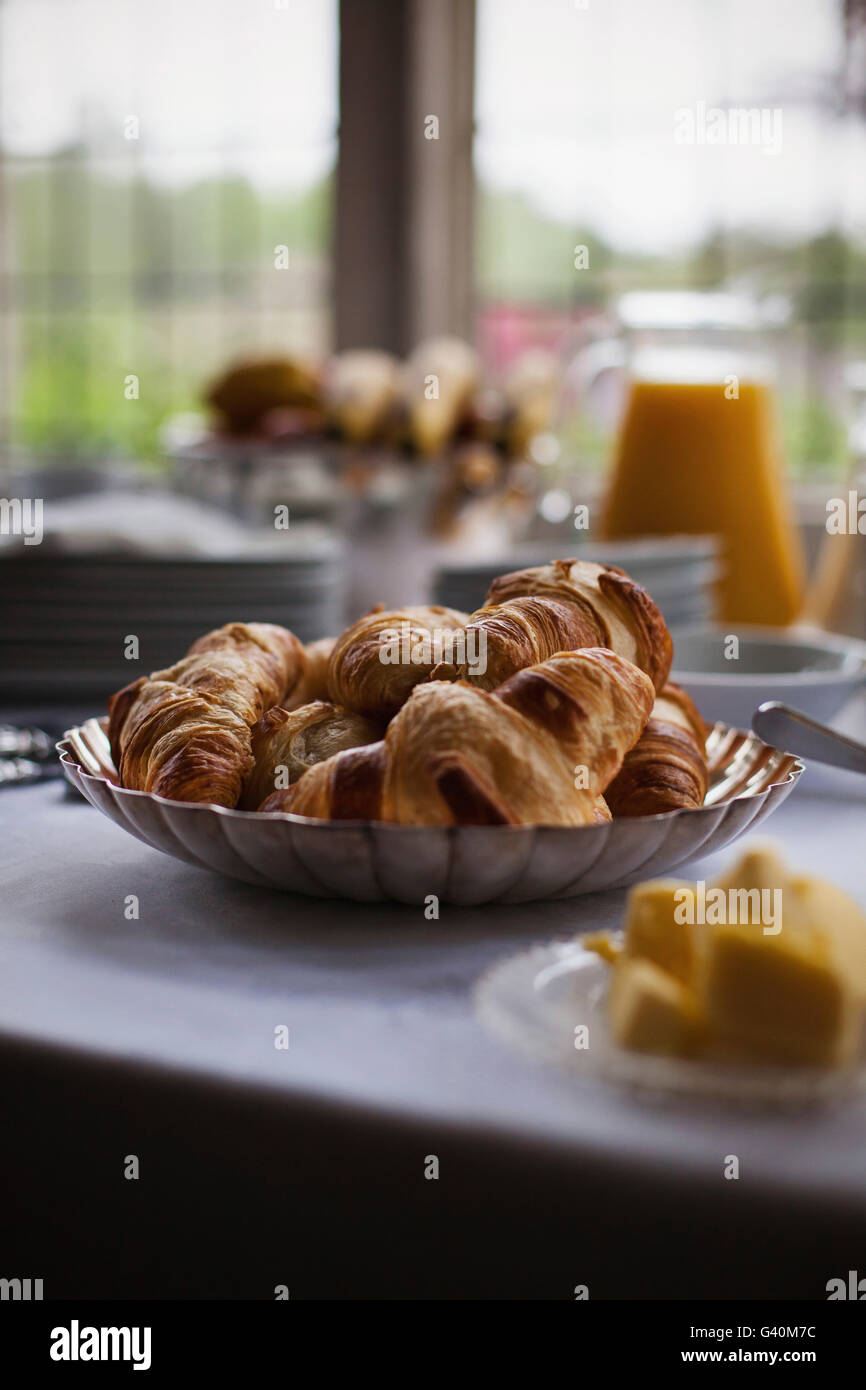 Freshly baked croissants on the breakfast table Stock Photo - Alamy
