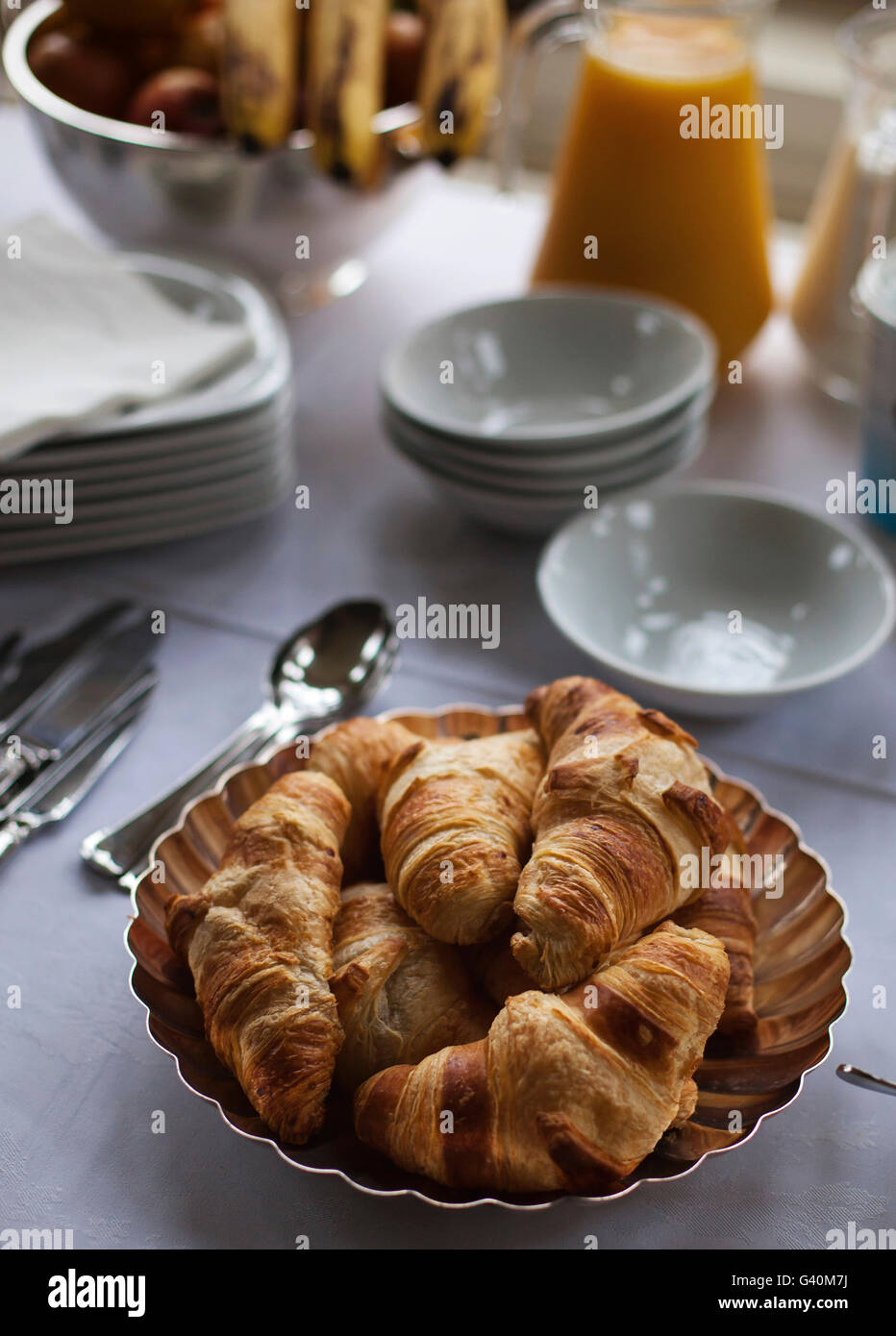 Freshly baked croissants on the breakfast table Stock Photo - Alamy