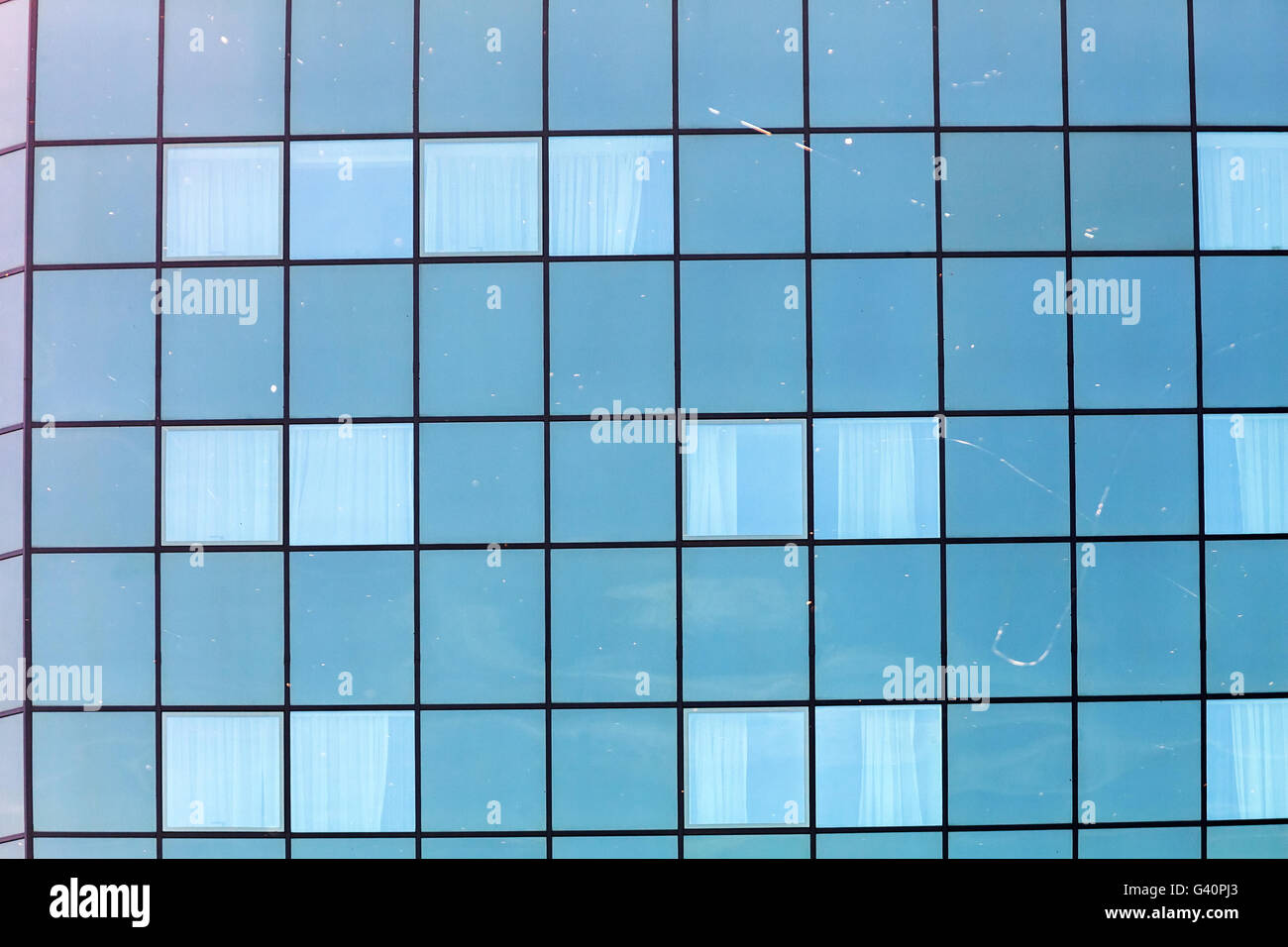 Modern office skyscraper with blue and green glass facade Stock Photo ...
