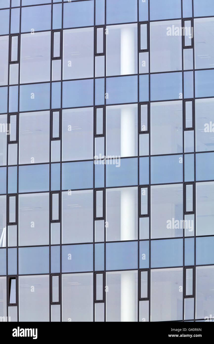 Modern office skyscraper with blue and green glass facade Stock Photo ...