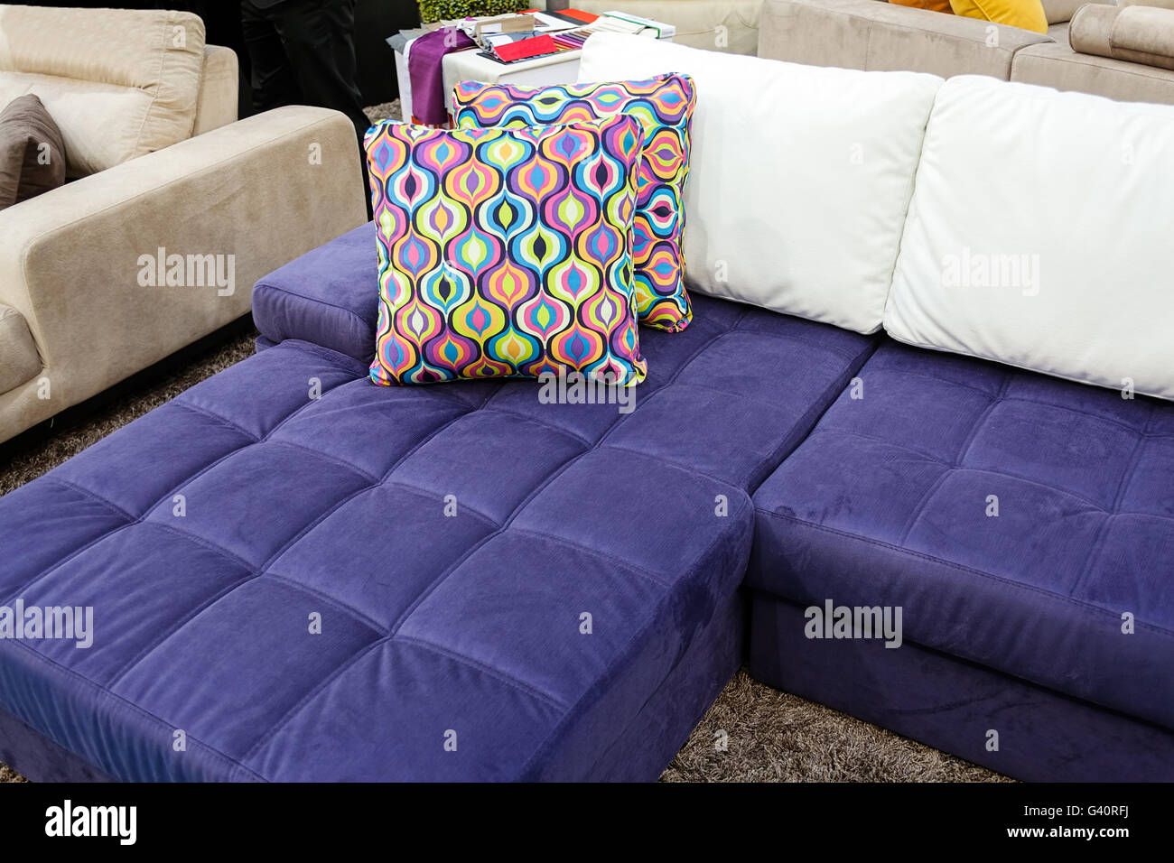 purple comfort couch with modern pillow for interior Stock Photo - Alamy
