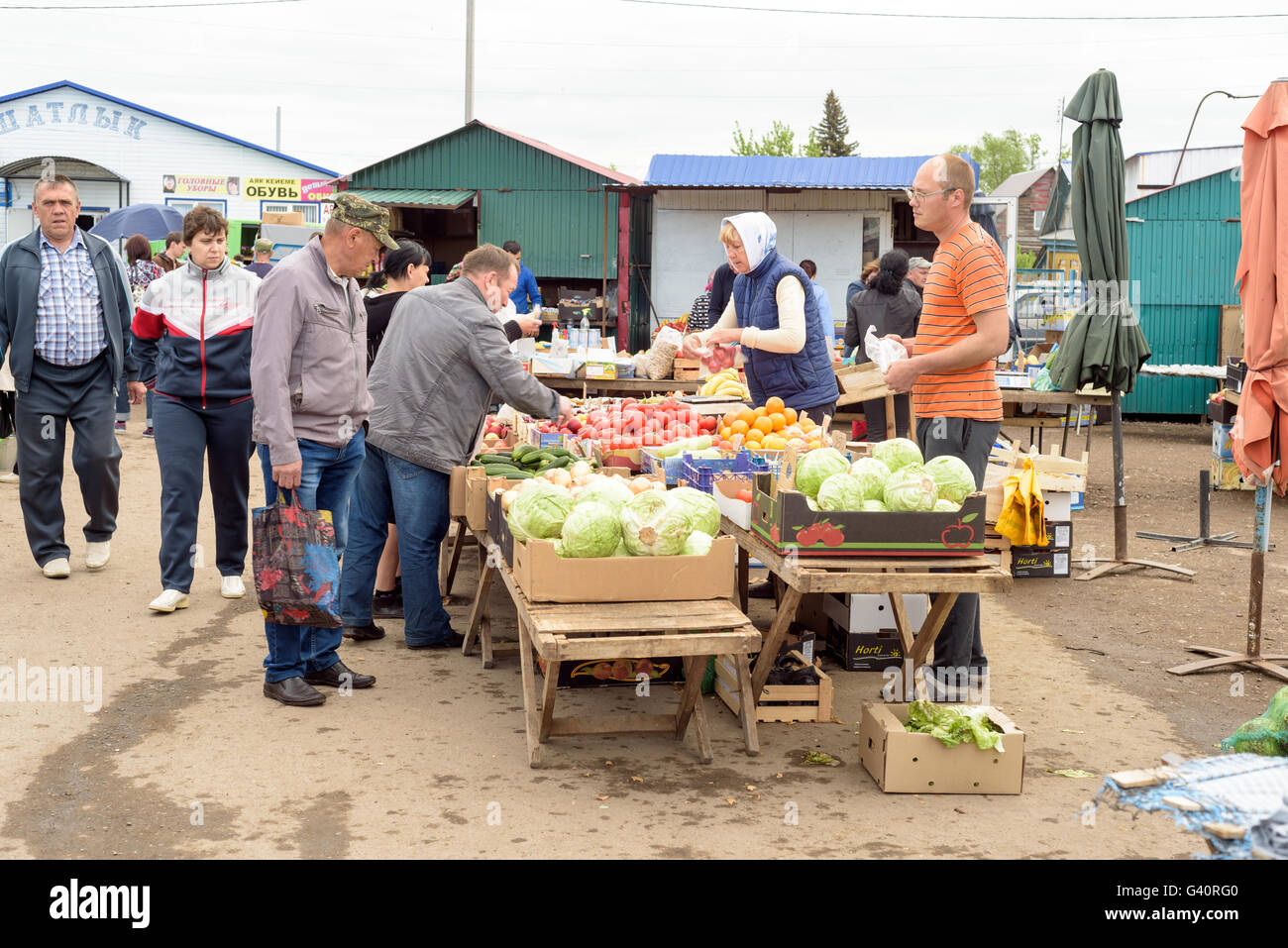 People buying fruit at a local Russian outdoor vegetable stall Stock ...