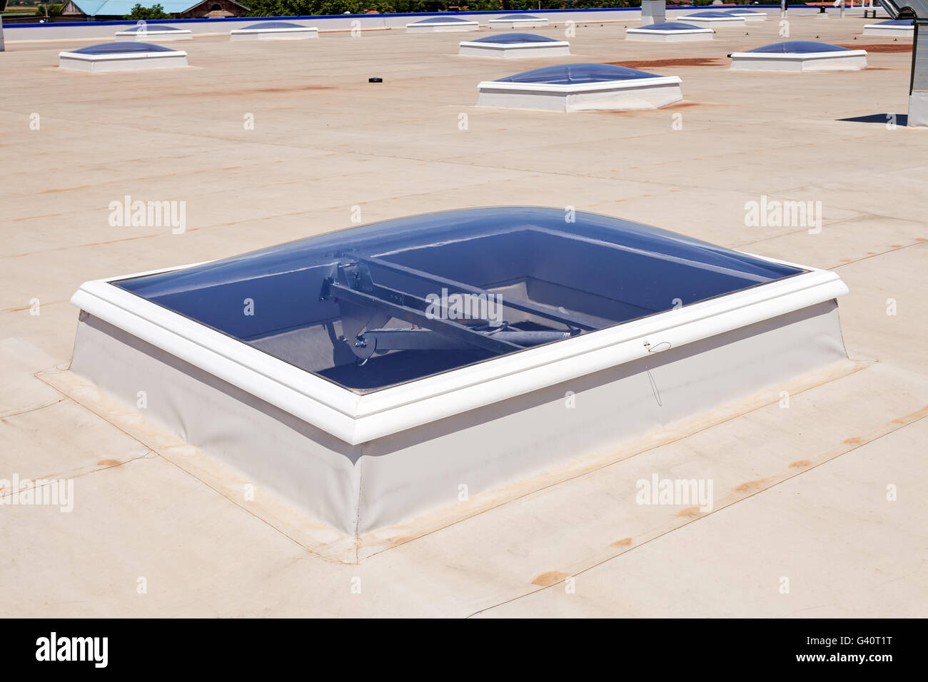 Flat roof with skylight and hydro insulation membranes Stock Photo - Alamy