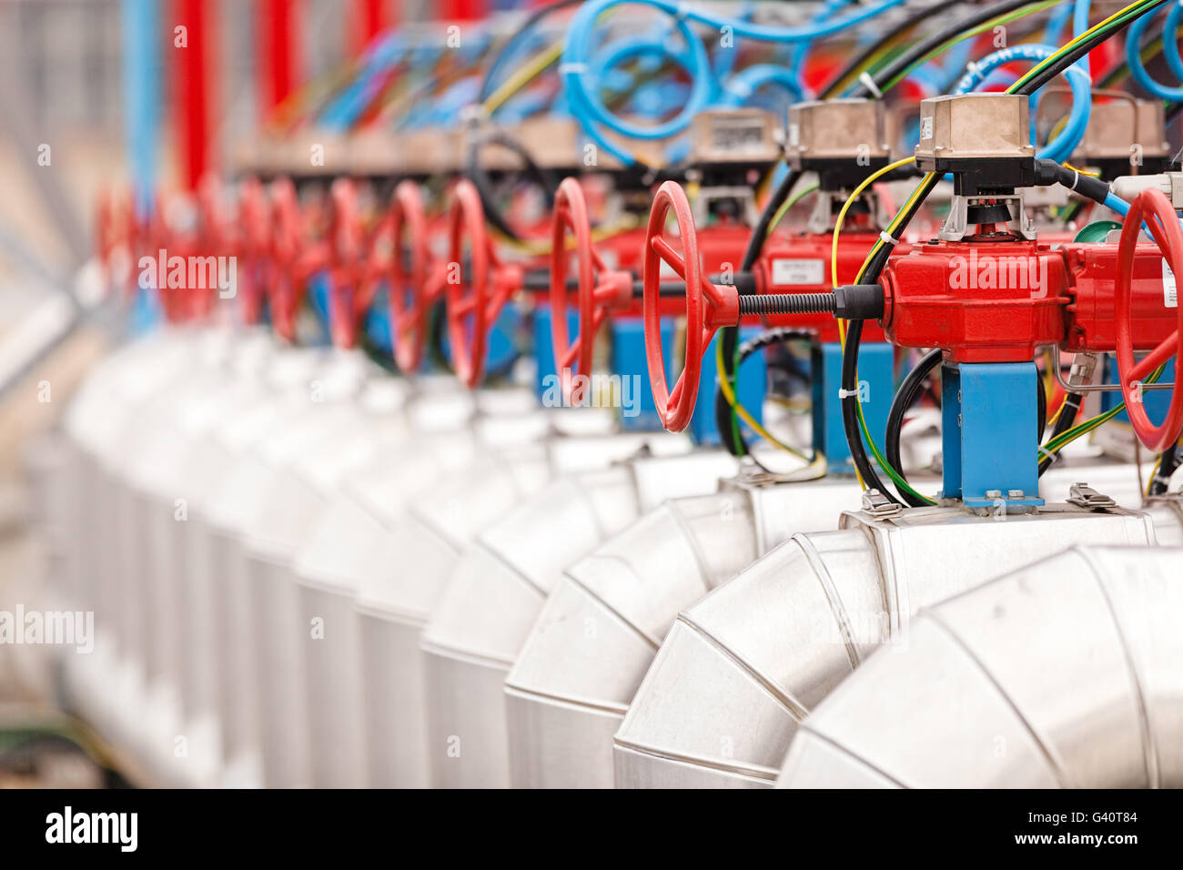 detail of oil pipeline with valves in large oil refinery Stock Photo ...