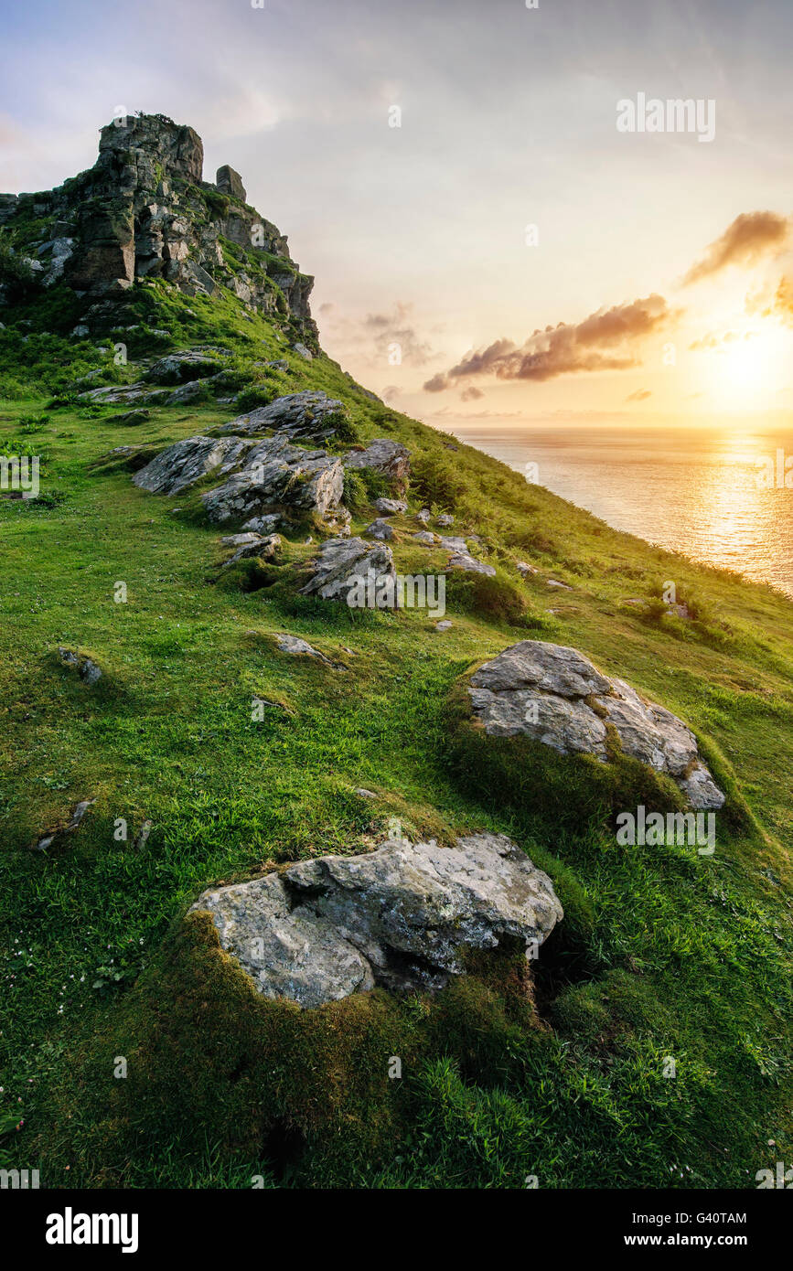 Beautiful sunset landscape image of Valley of The Rocks in Devon ...