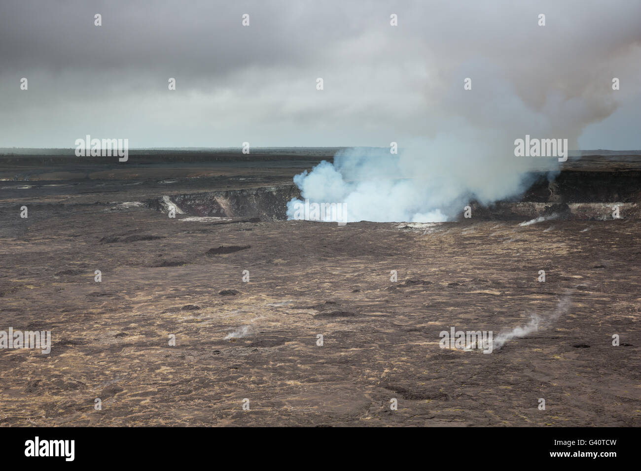 Volcanic fumes reaching for heavy skies Stock Photo - Alamy