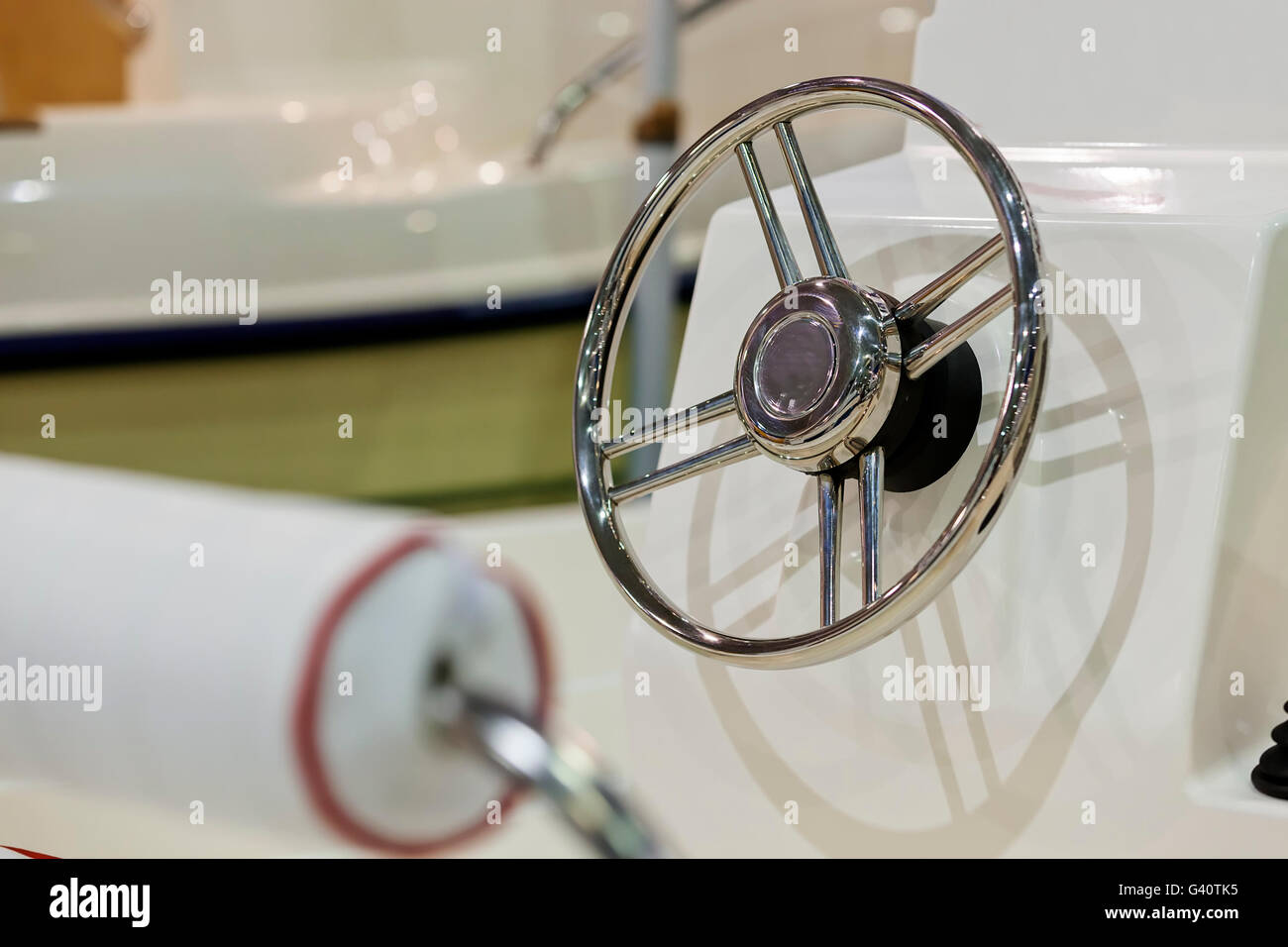 new powerful chrome steering wheel for boat; note shallow depth of ...