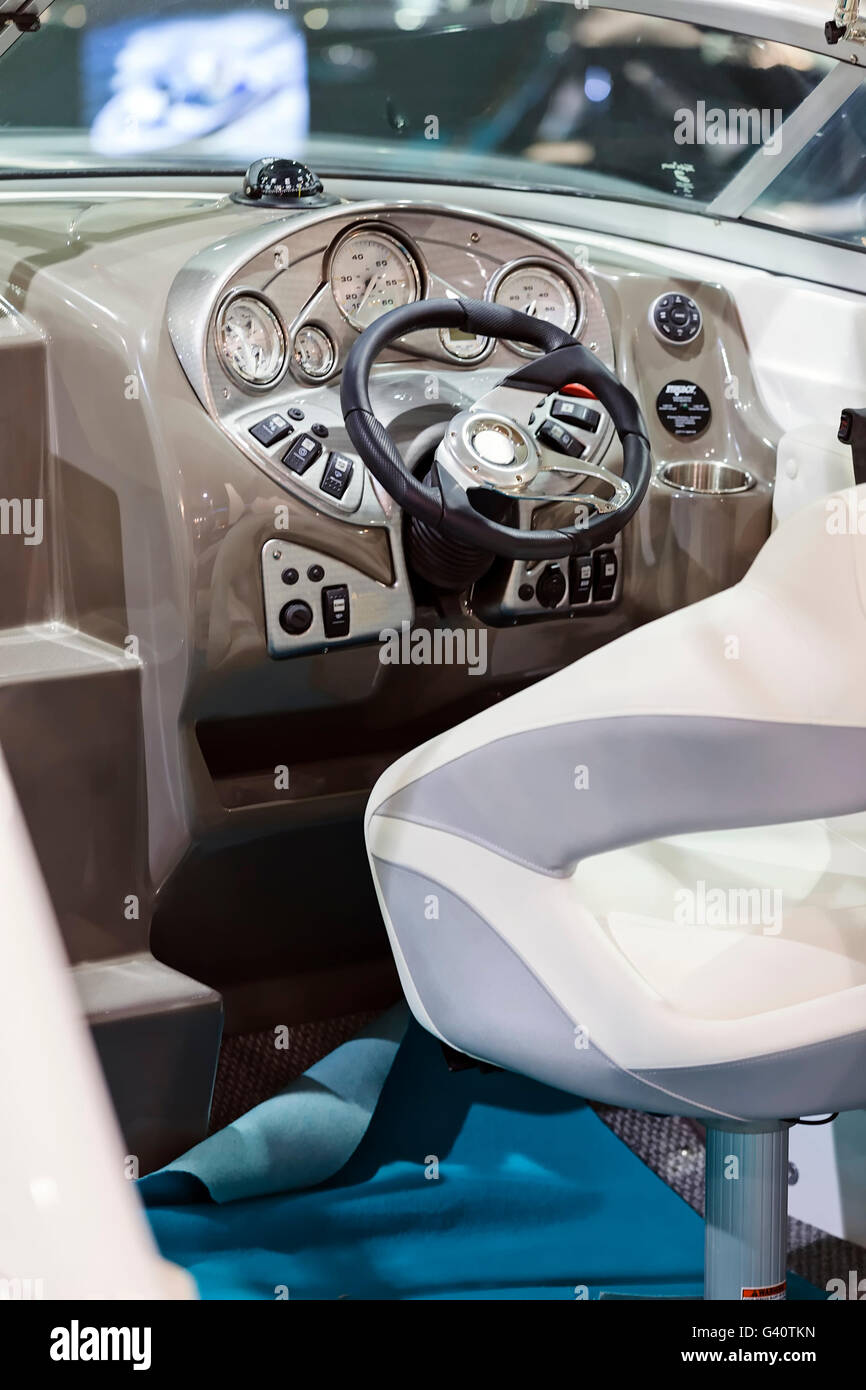 leather steering wheel for boat with control board Stock Photo - Alamy