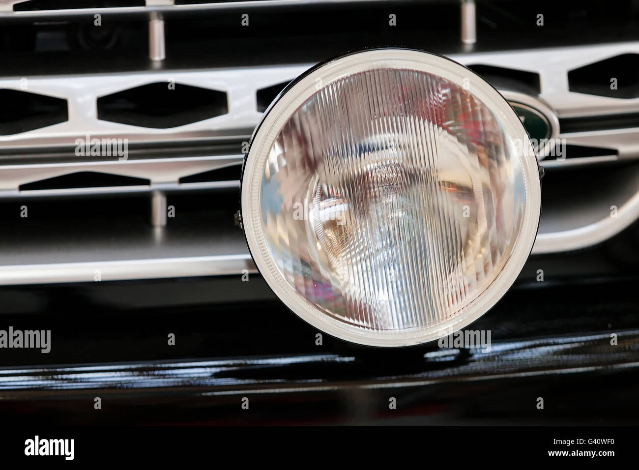 Detail of one retro car headlight with background Stock Photo - Alamy