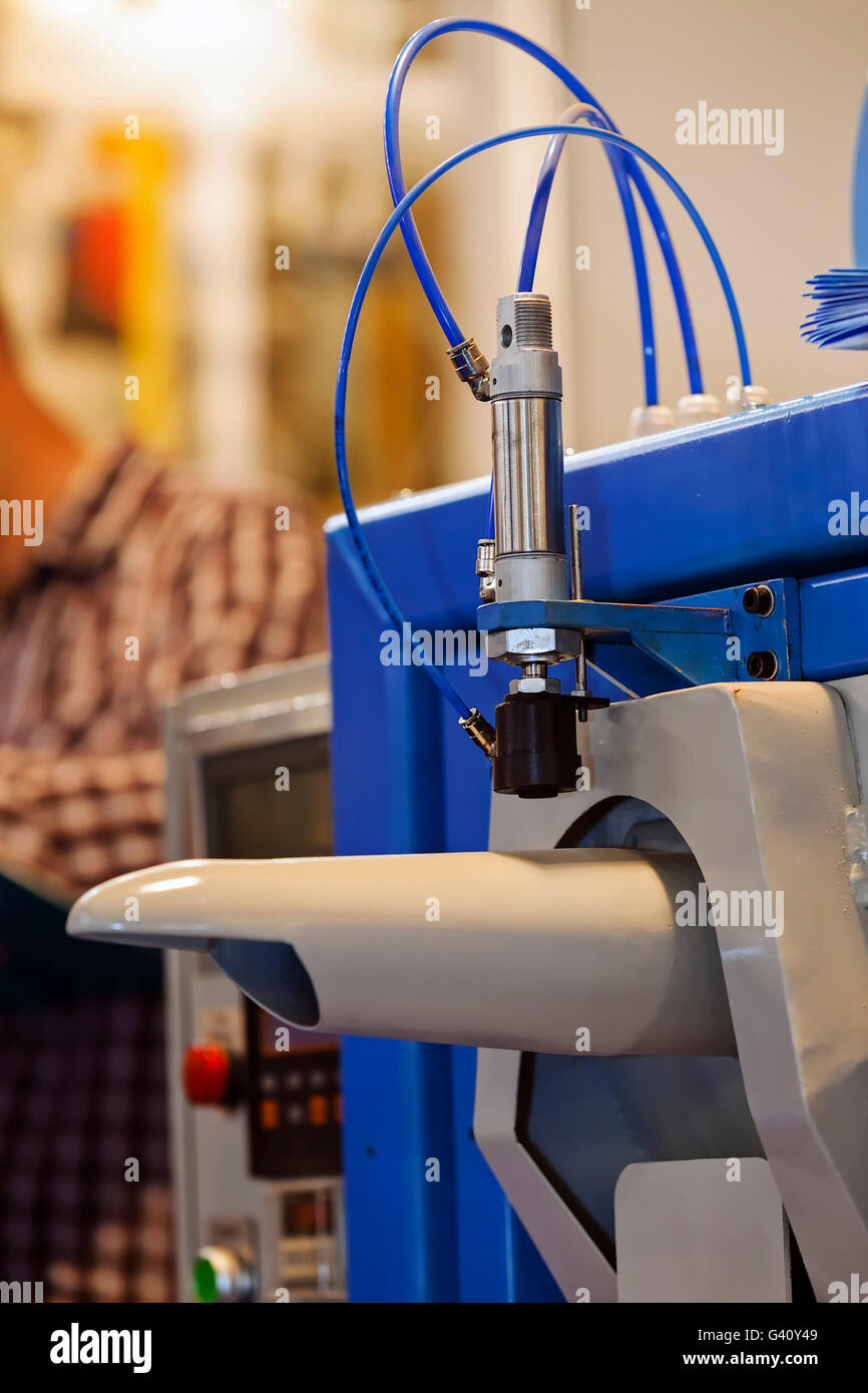 Focus on detail of engine for industry; note shallow depth of field ...