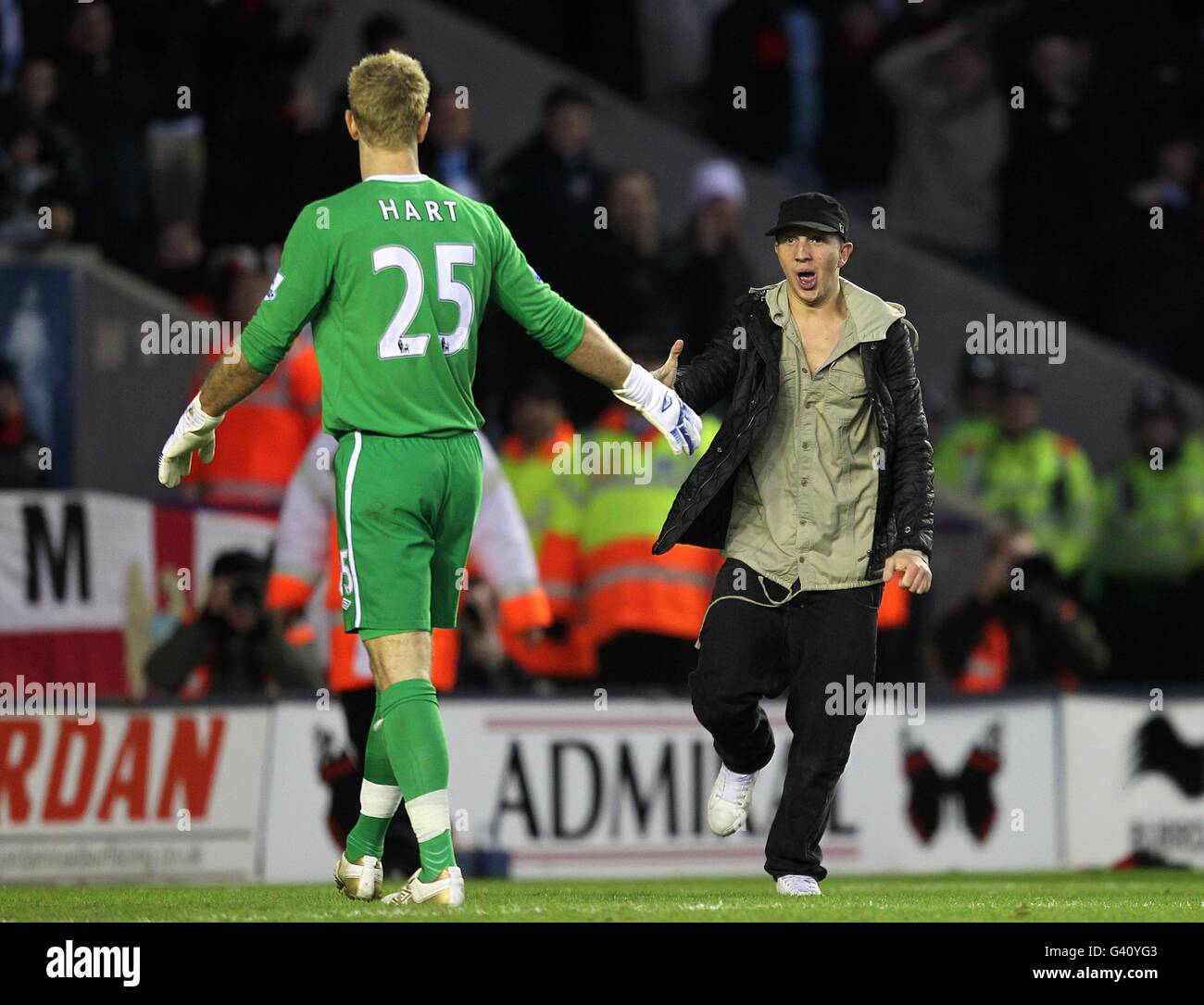 Full length football pitch invader datacoapplies hi-res stock ...