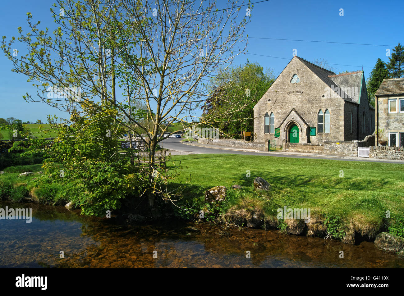 UK, North Yorkshire, Malham, Malham Beck and Methodist Chapel Stock ...