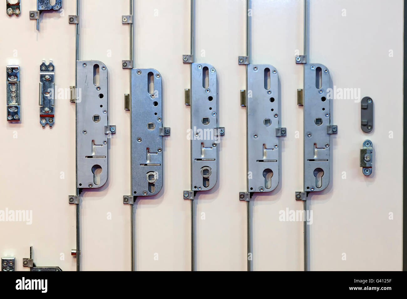 Five steel door lock mechanisms on exhibition Stock Photo - Alamy