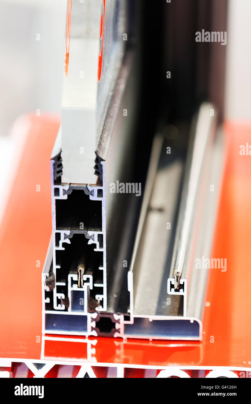 Window profile cut of with metal, glass and insulation Stock Photo - Alamy