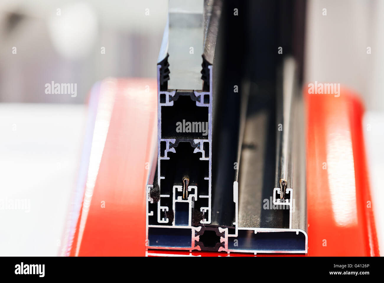 Window profile cut of with metal, glass and insulation Stock Photo - Alamy