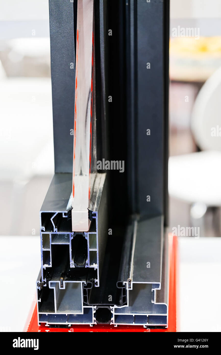 Window profile cut of with metal, glass and insulation Stock Photo - Alamy