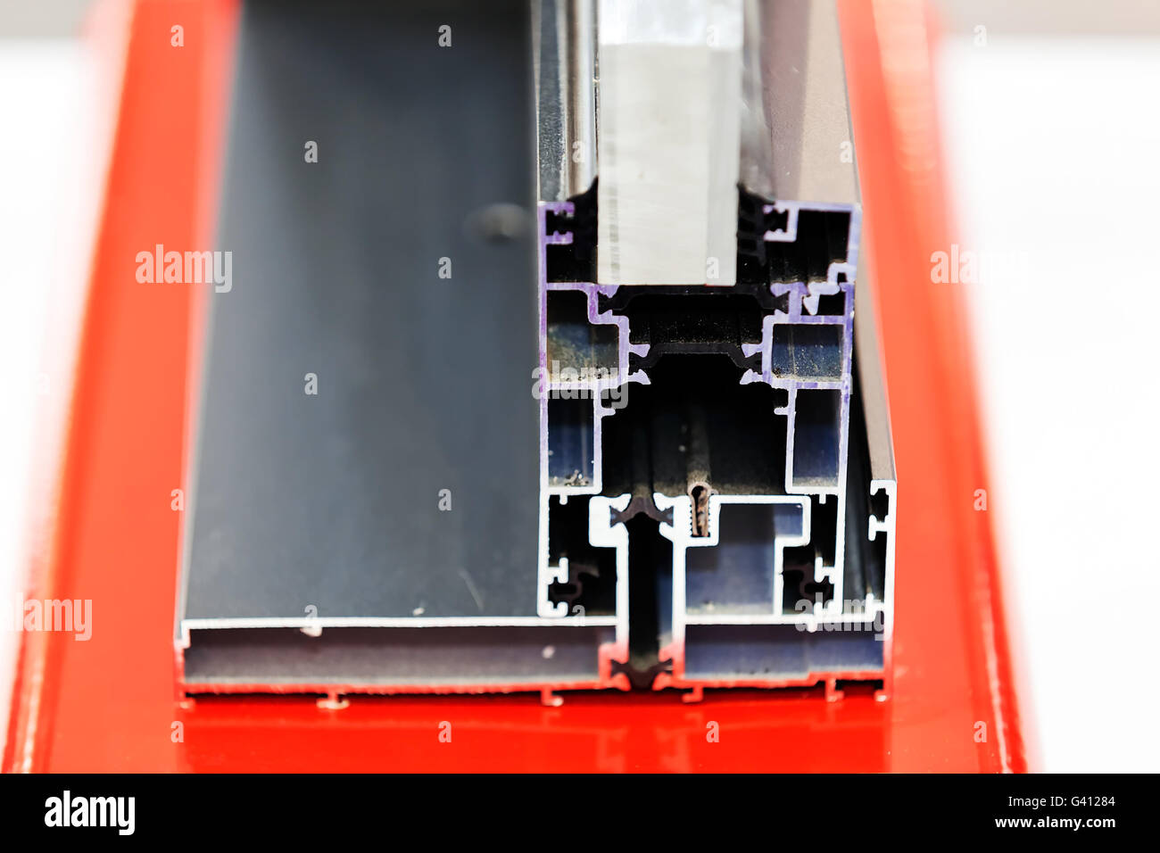 Window profile cut of with metal, glass and insulation Stock Photo - Alamy