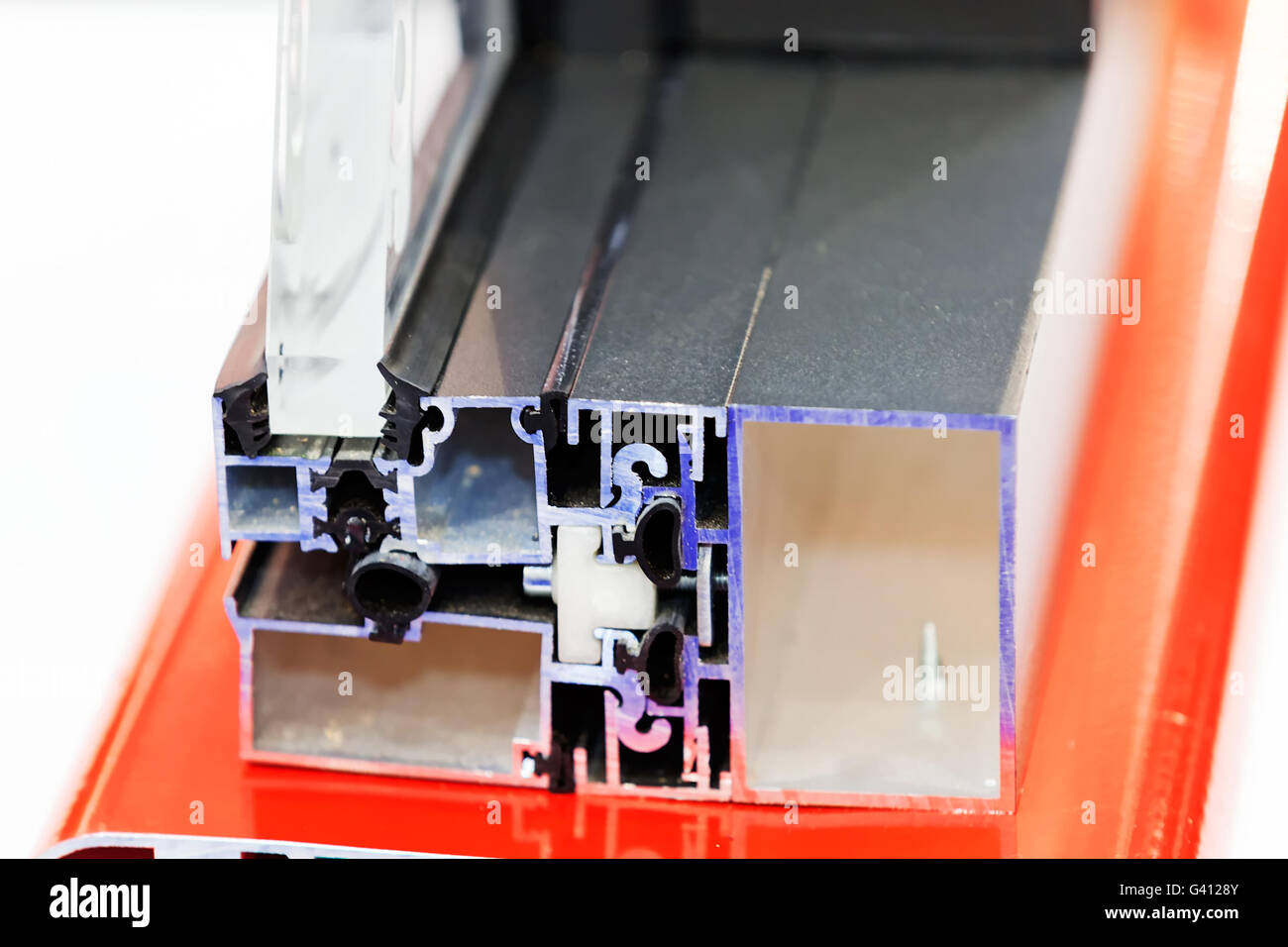 Window profile cut of with metal, glass and insulation Stock Photo - Alamy