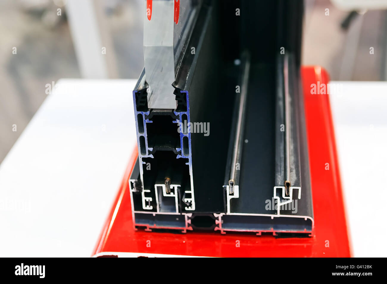 Window profile cut of with metal, glass and insulation Stock Photo - Alamy