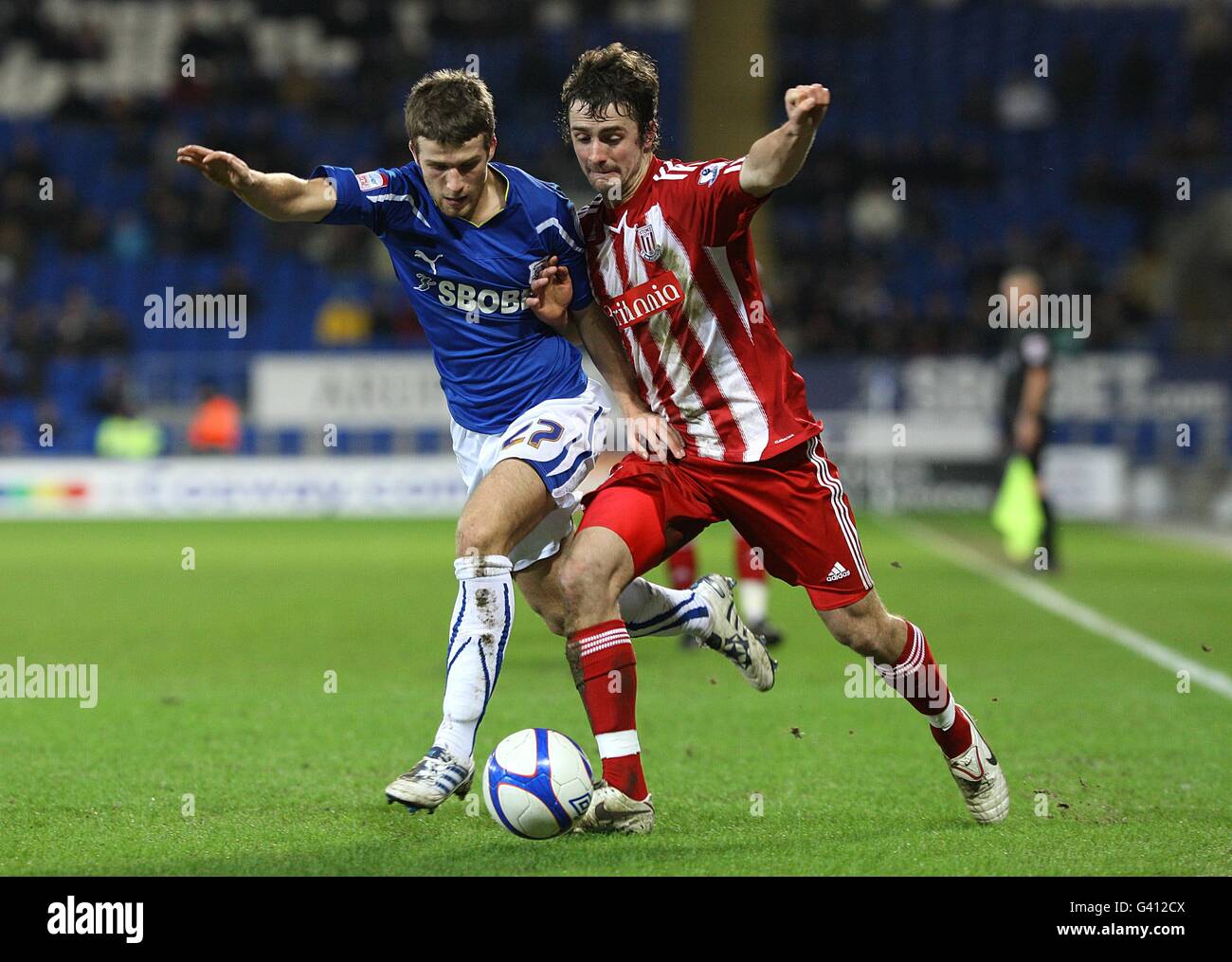 Cardiff City's Adam Matthews and Stoke City's Danny Pugh battle for the ...