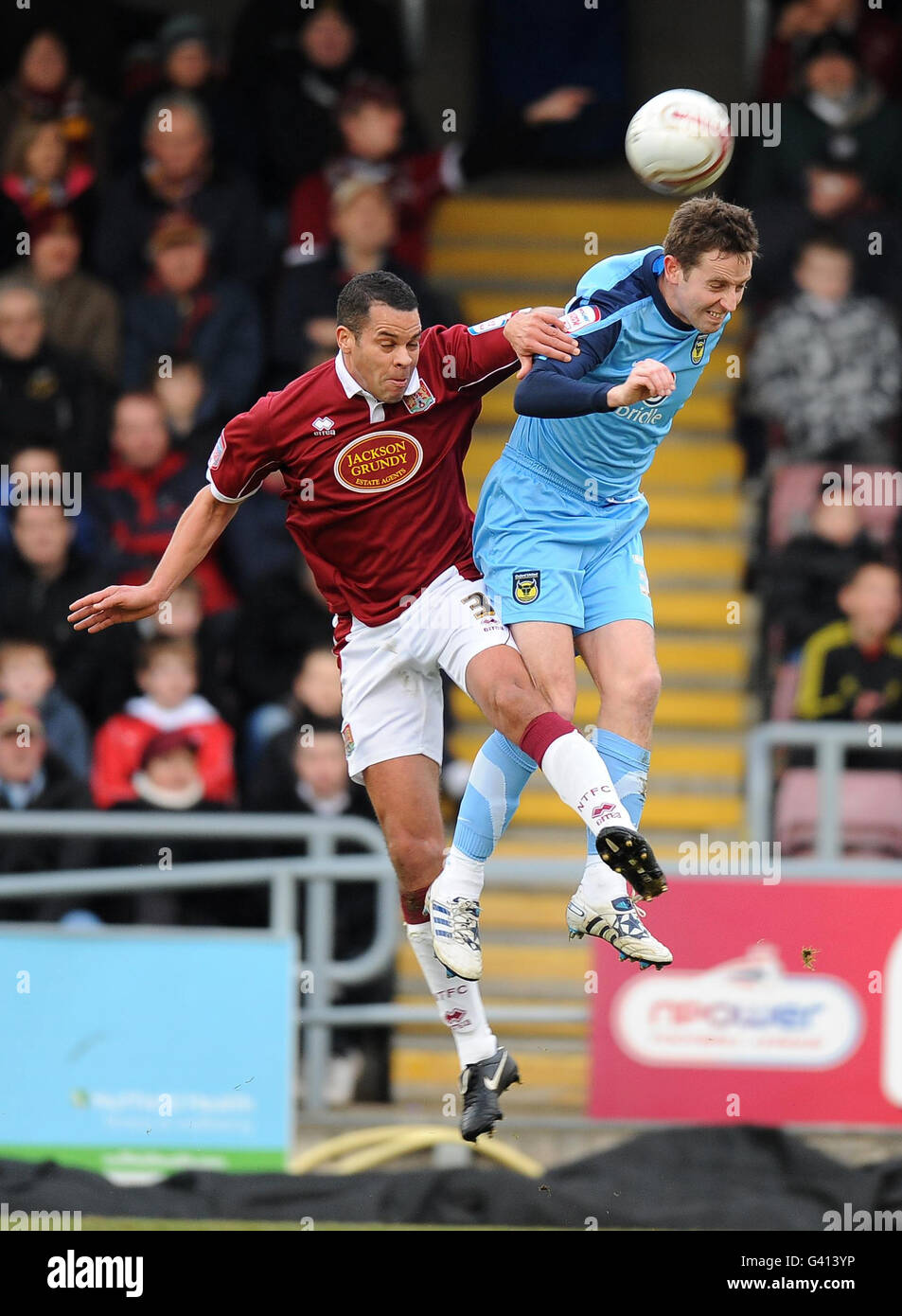 Northampton Town's Marcus Hall and Oxford United's Steve MacLean (right ...