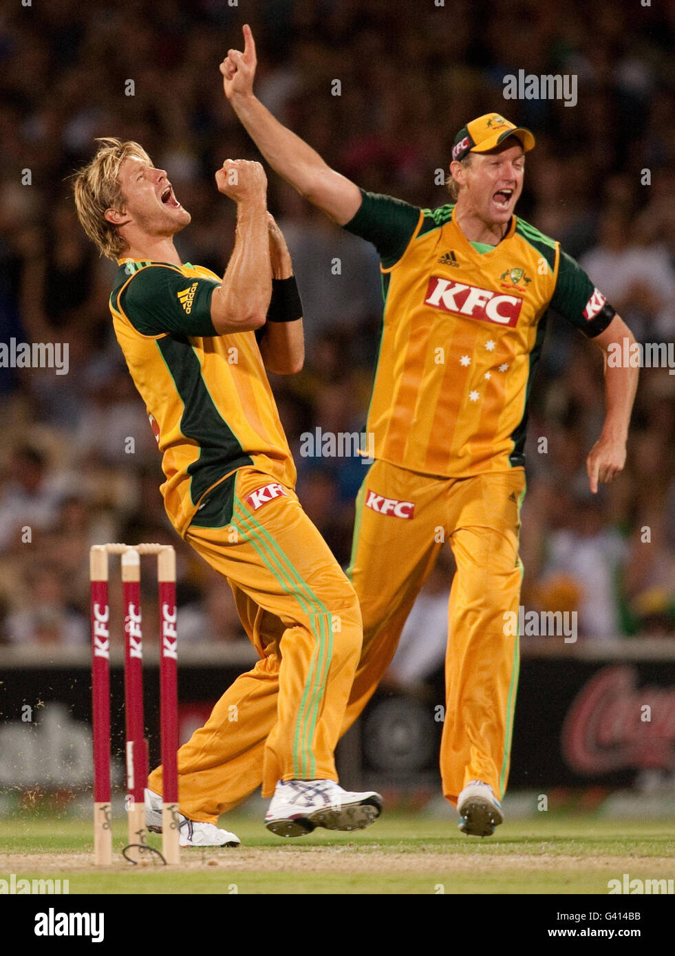 Australia's Shane Watson celebrates with Cameron White after dismissing ...