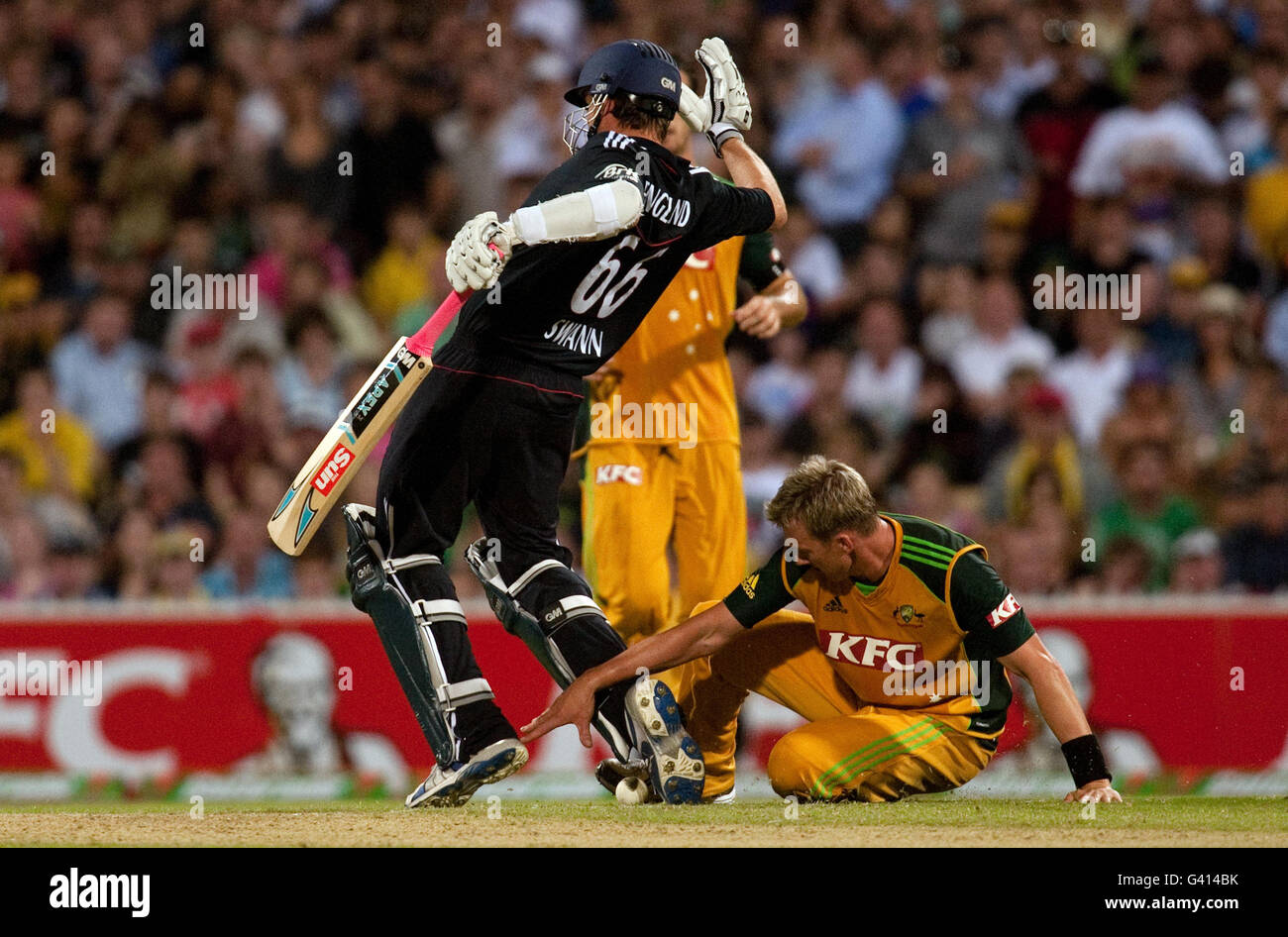 Australia's Brett Lee reaches for the ball from underneath England's ...
