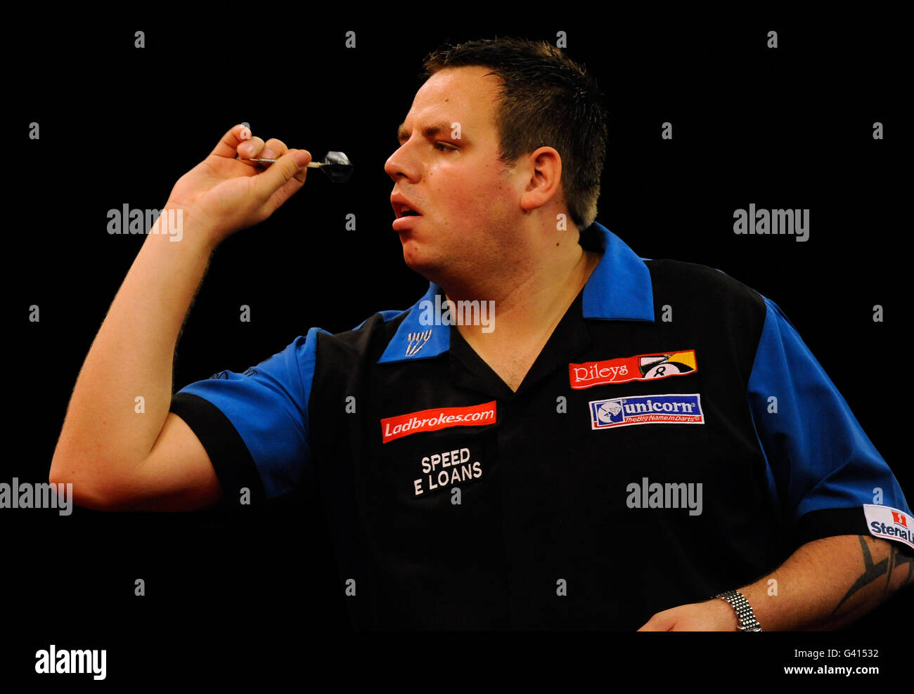 Adrian Lewis in action during the Ladbrokes.com World Darts ...