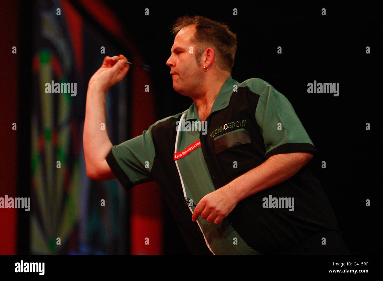 Steve Farmer in action against Paul Nicholson in their first round ...
