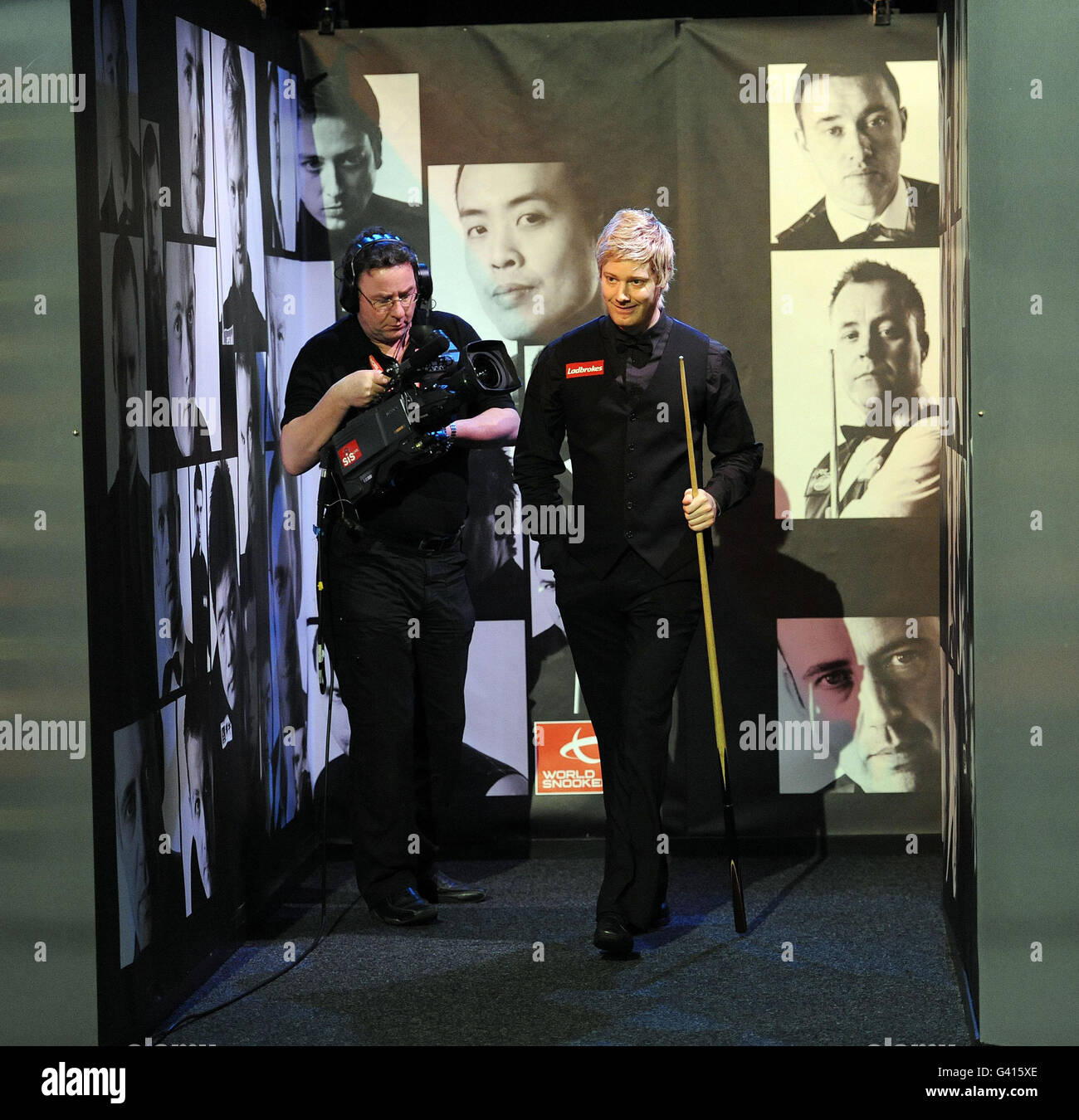 Australia's Neil Robertson enters the arena for his match against ...