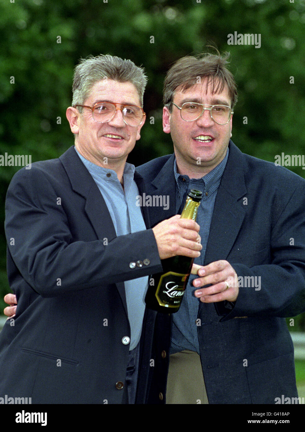 Lottery winners Mark Gardiner (right) and Paul Maddison celebrate their ...