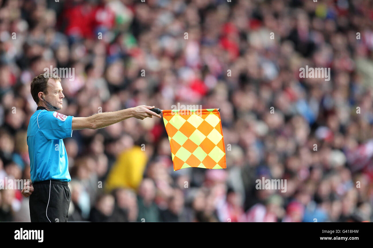 The referees assistant signals an offside hi-res stock photography and ...