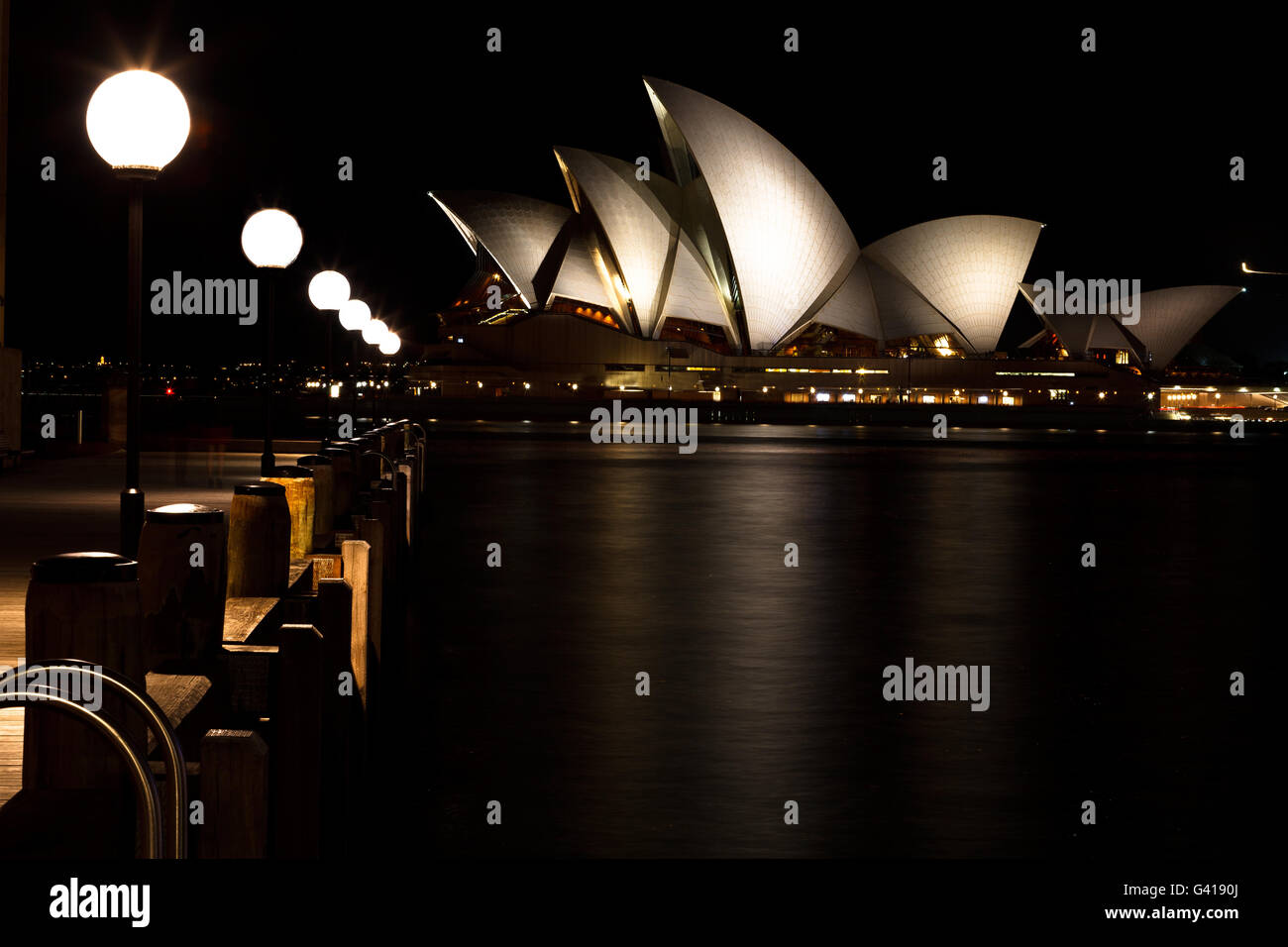 Sydney Opera House at night from across the harbour Stock Photo - Alamy