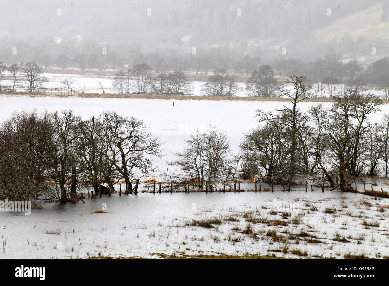 Flooded fields near Strathyre, Stirling after the River Teith burst its ...
