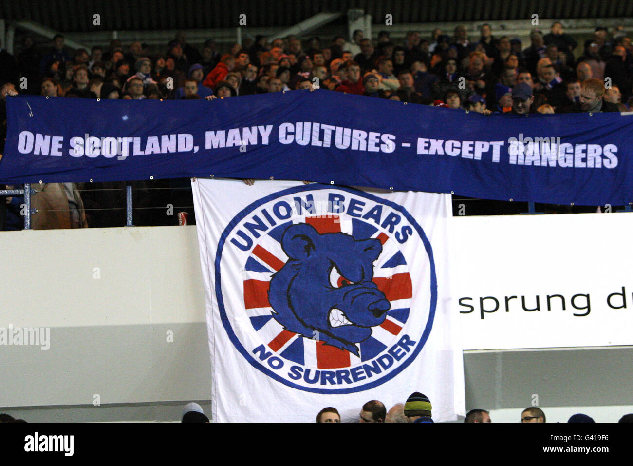 Rangers fans unfurl a banner in support of their side Stock Photo - Alamy