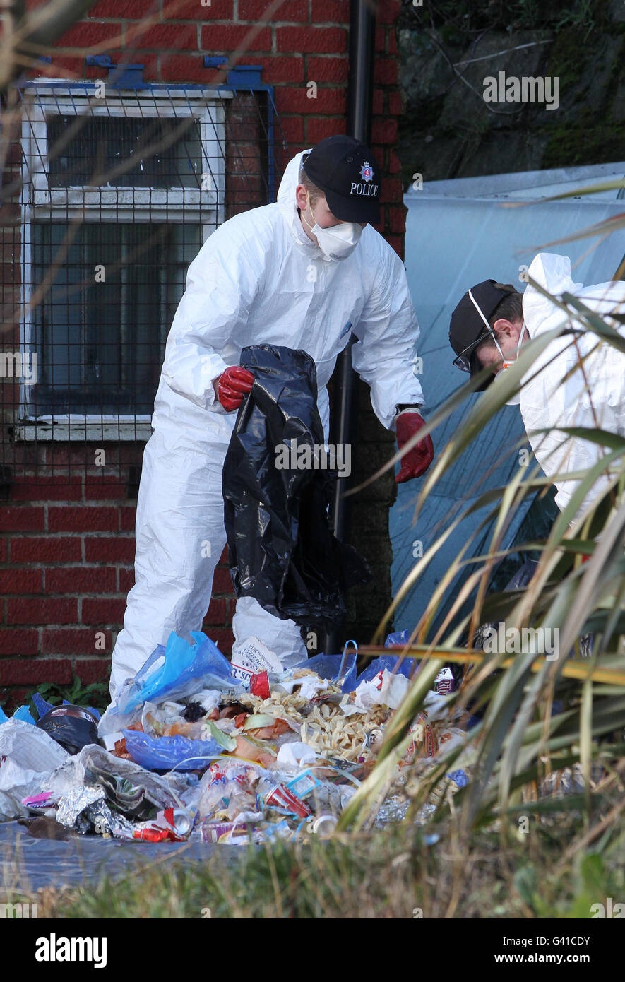 Forensic officers at the scene in Folkestone, Kent, where a man was ...