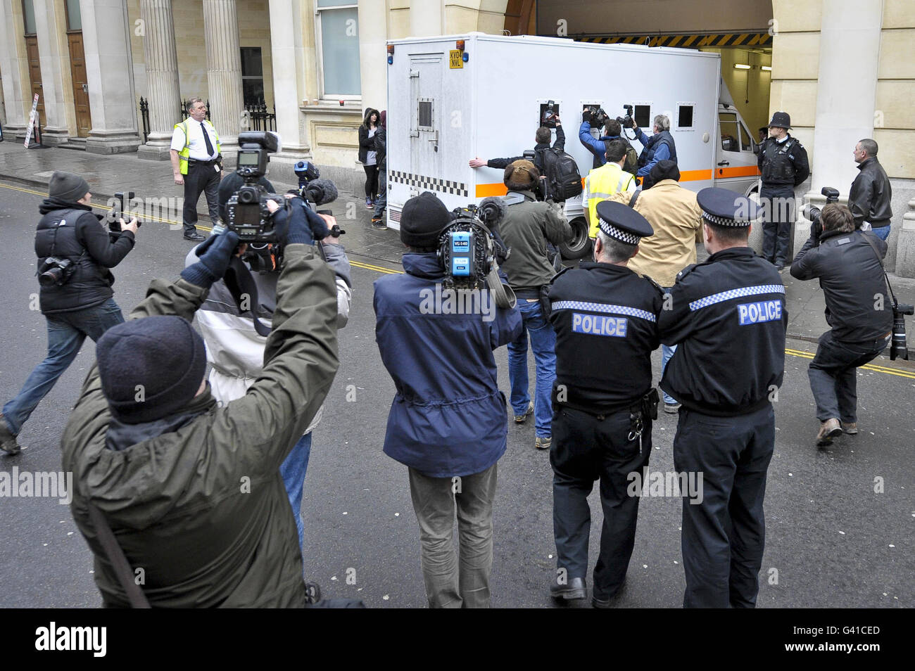 Member of the media attempt to get a picture of Vincent Tabak as the ...