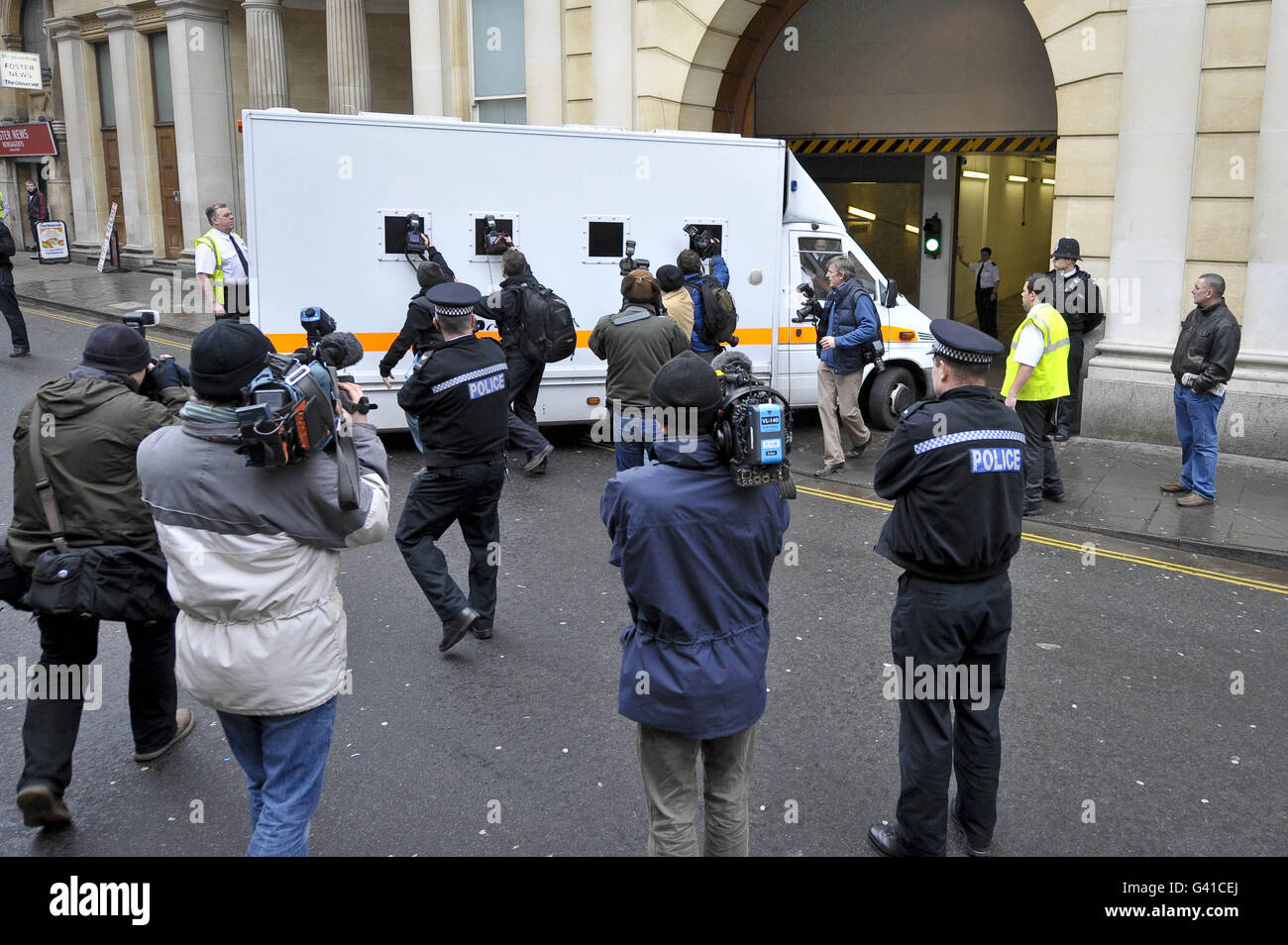 Member of the media attempt to get a picture of Vincent Tabak as the ...